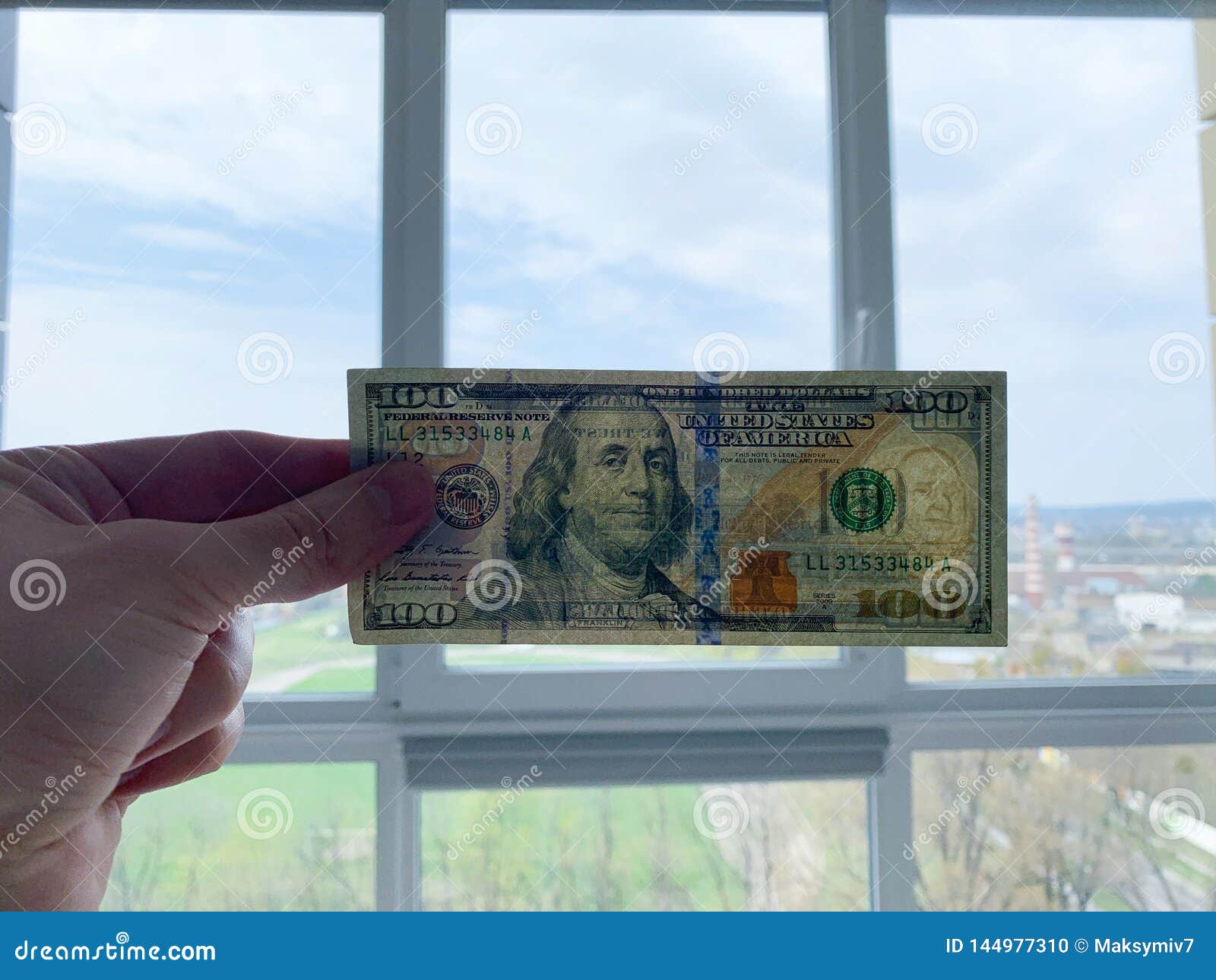 Hand Holding Banknote of 100 US Dollar in Hand Stock Photo - Image of ...