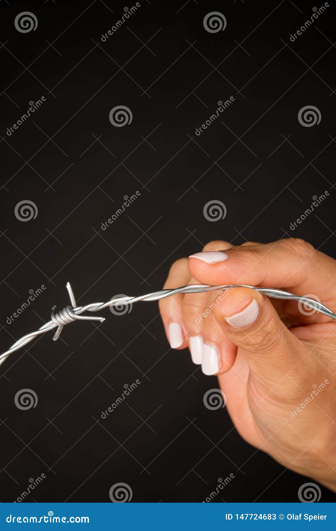 Hand holding barbed wire stock image. Image of exclusion - 147724683