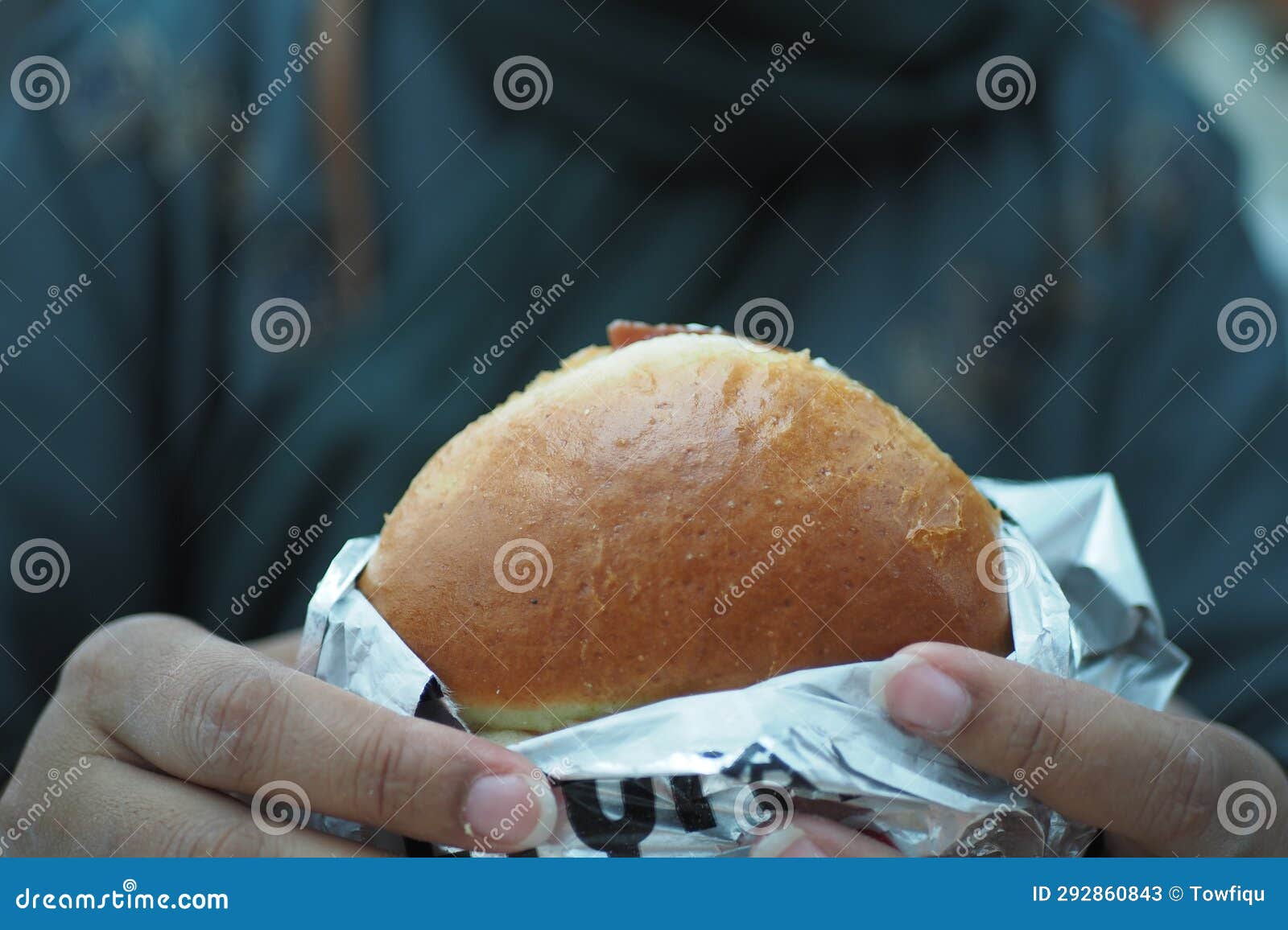 Hand Holding Beef Burger on Table Close Up Stock Image - Image of beef ...