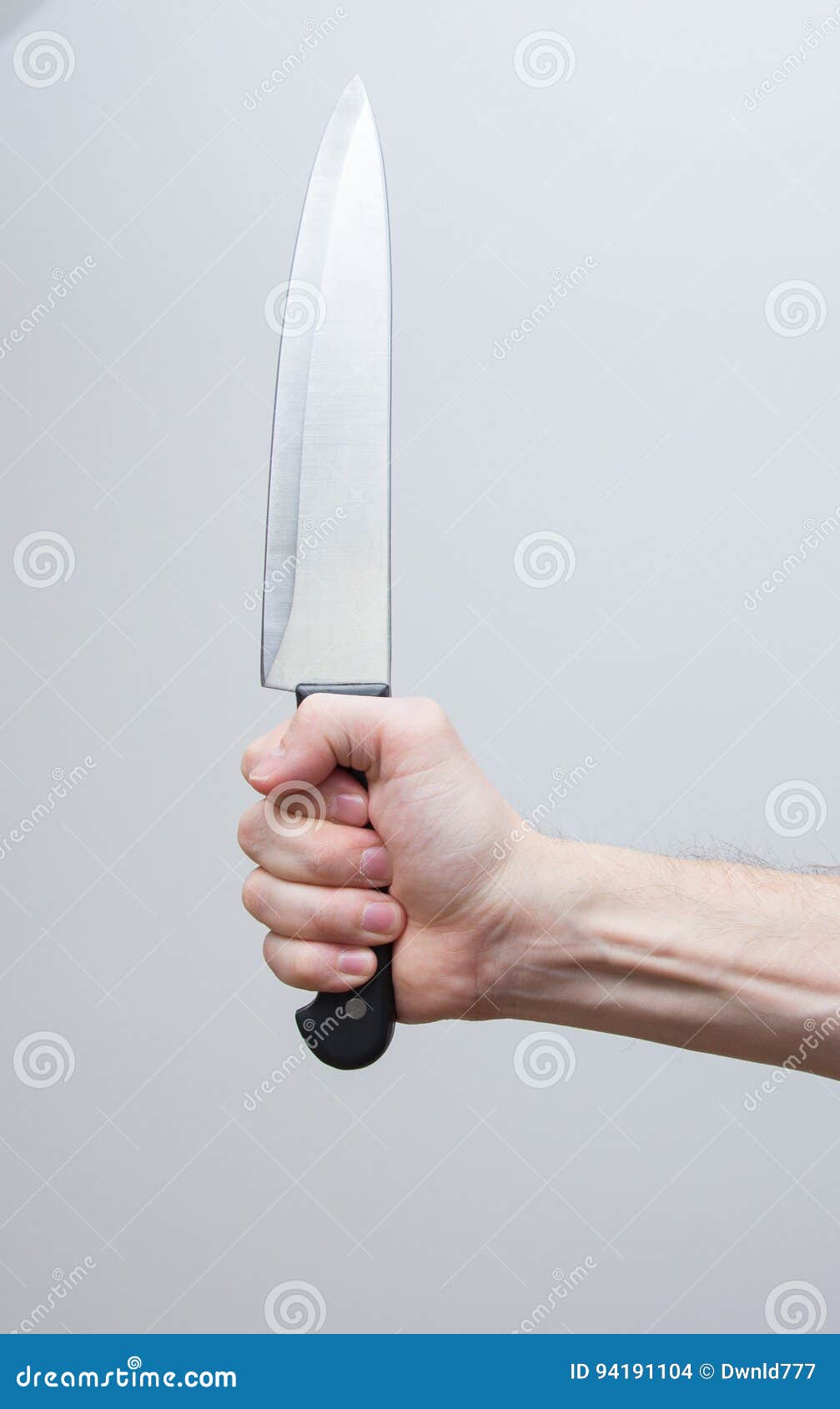 Hand holding big knife stock photo. Image of assassin - 94191104