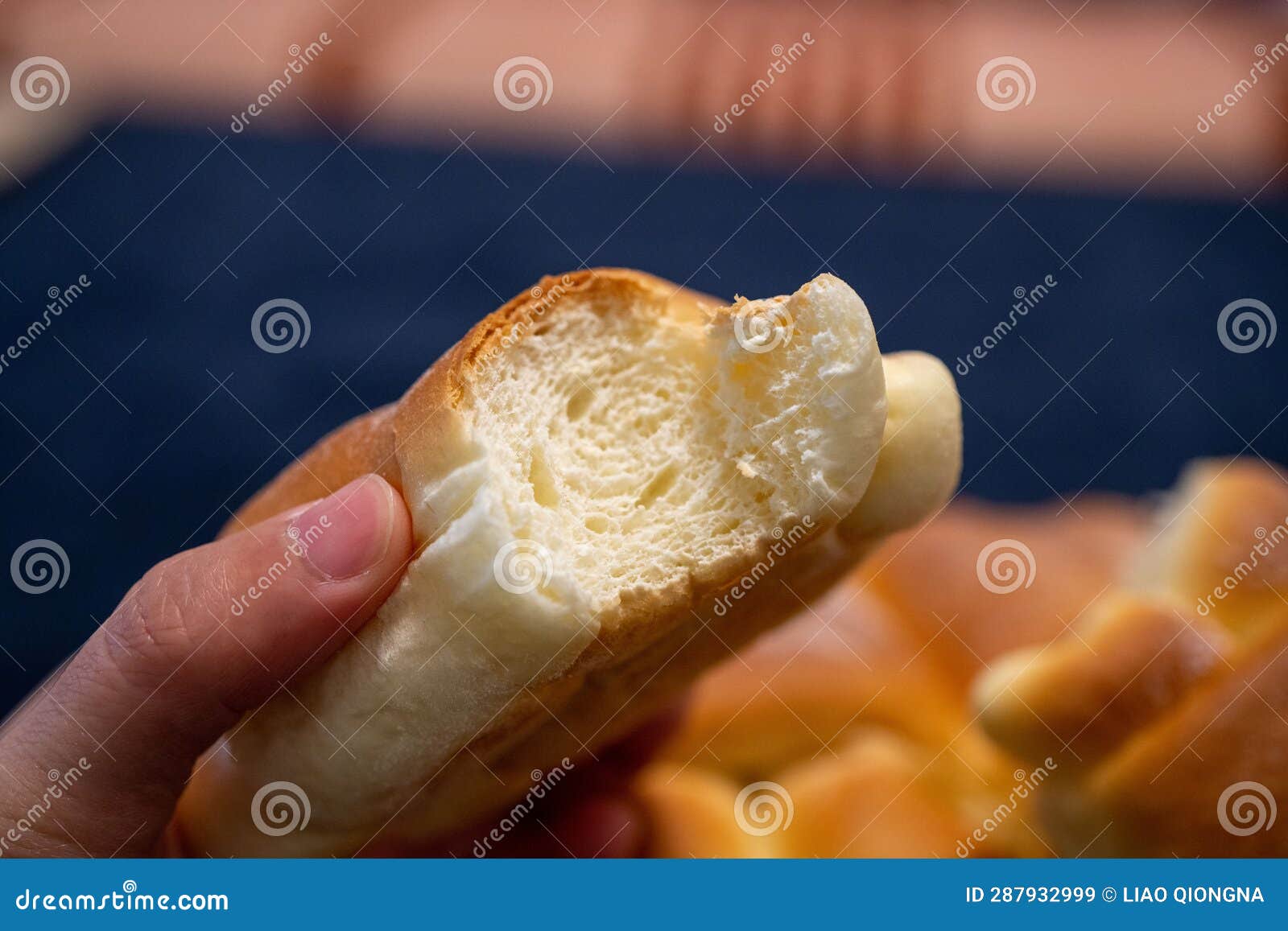 The Hand is Holding a Bitten Bread. Stock Image - Image of hand, food ...