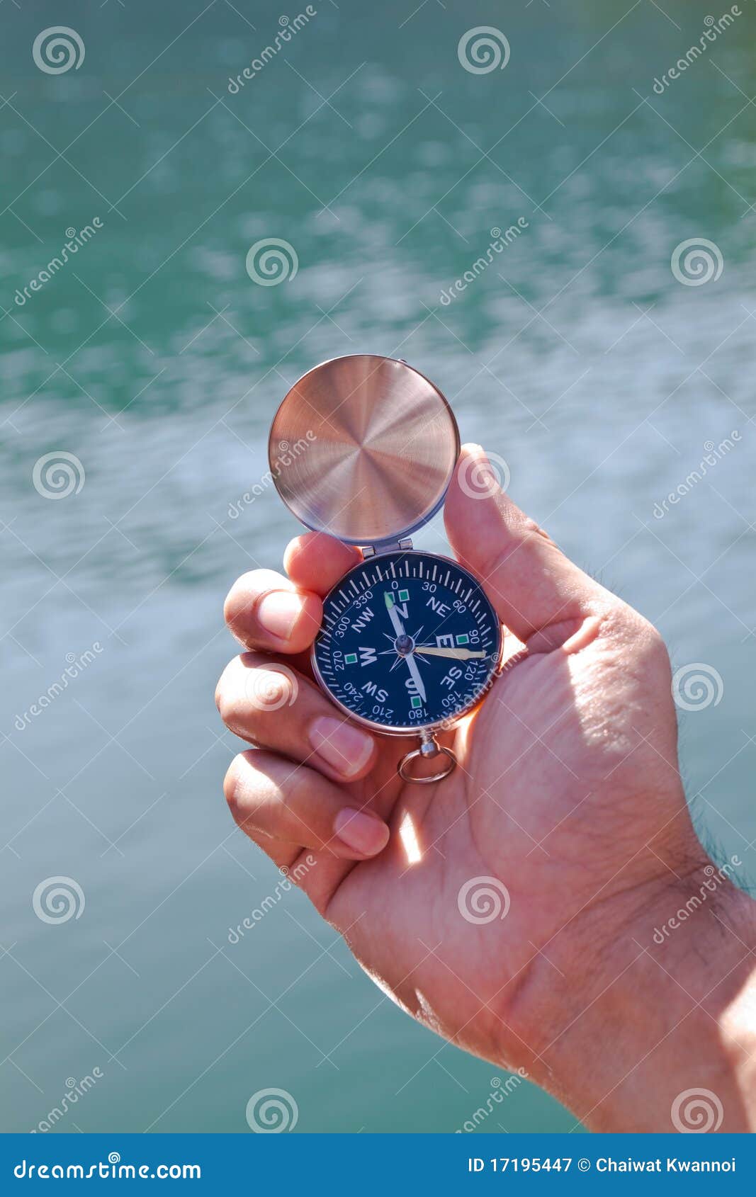 Hand Holding the Black Compass Stock Image - Image of navigate ...
