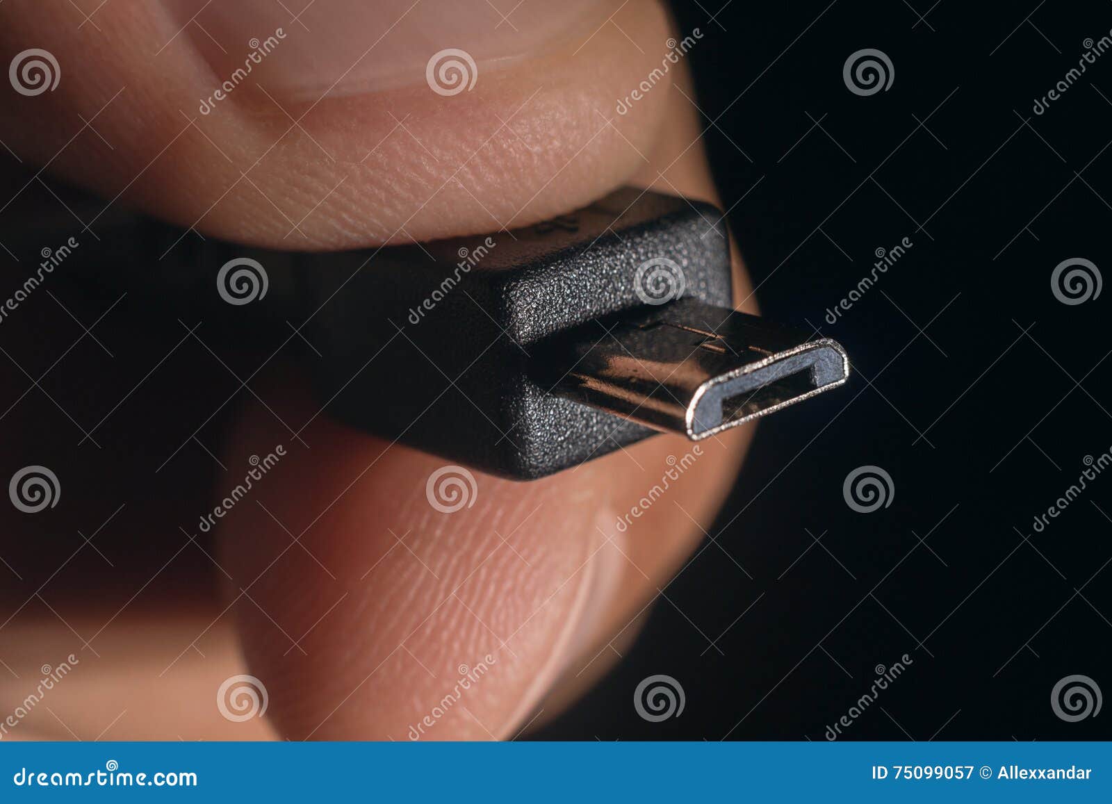 Hand Holding Black Micro USB Cable. Man S Hand Holds a USB Micro ...