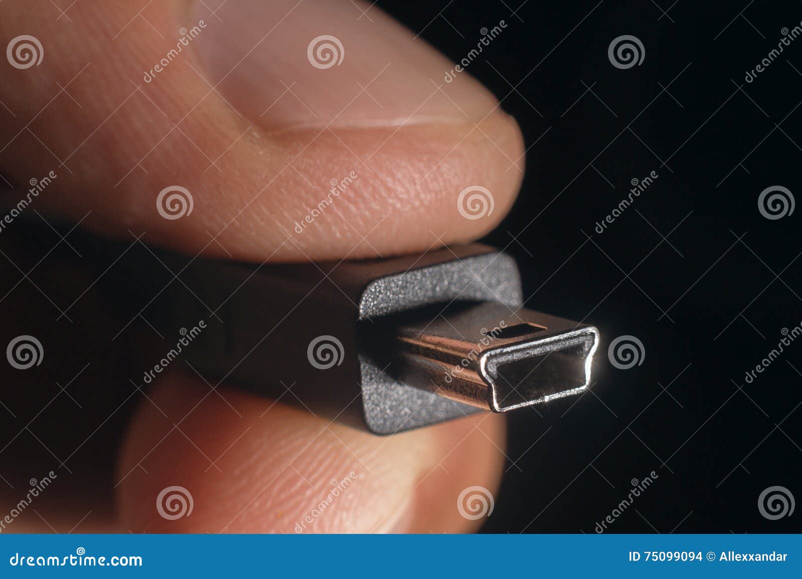 Hand Holding Black Mini USB Cable. Man S Hand Holds a USB Mini ...