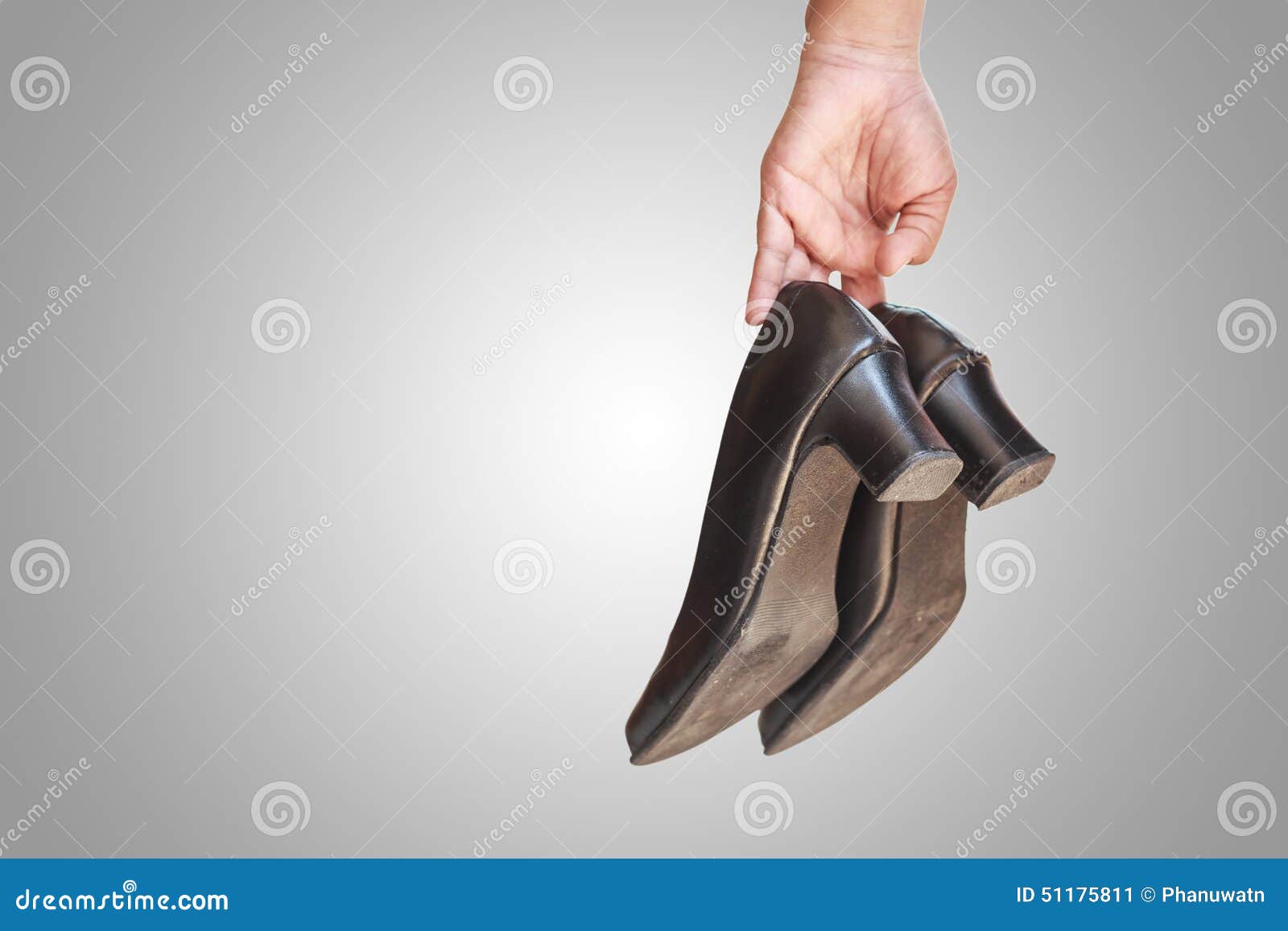 Hand holding black shoe stock image. Image of shiny, elegance - 51175811