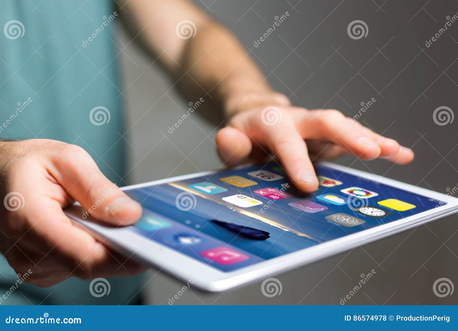 Hand Holding Black Tablet with Operating System Screen Stock Photo ...