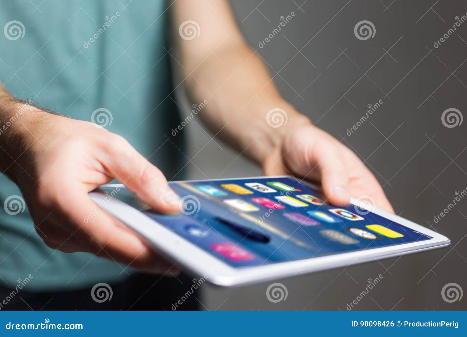 Hand Holding Black Tablet with Operating System Screen Stock Photo ...
