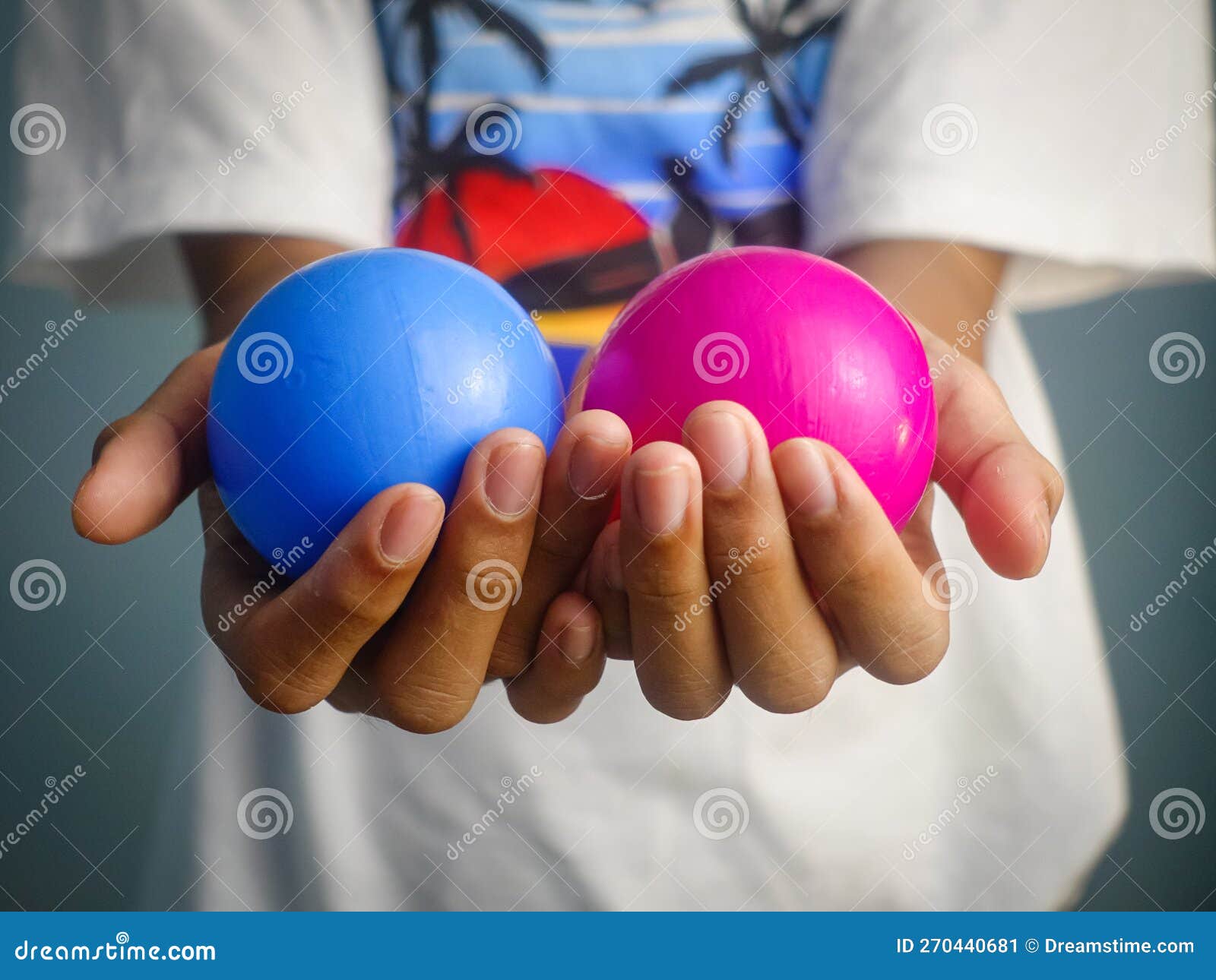 Hand Holding Blue Ball and Pink Ball Stock Image - Image of ball, food ...