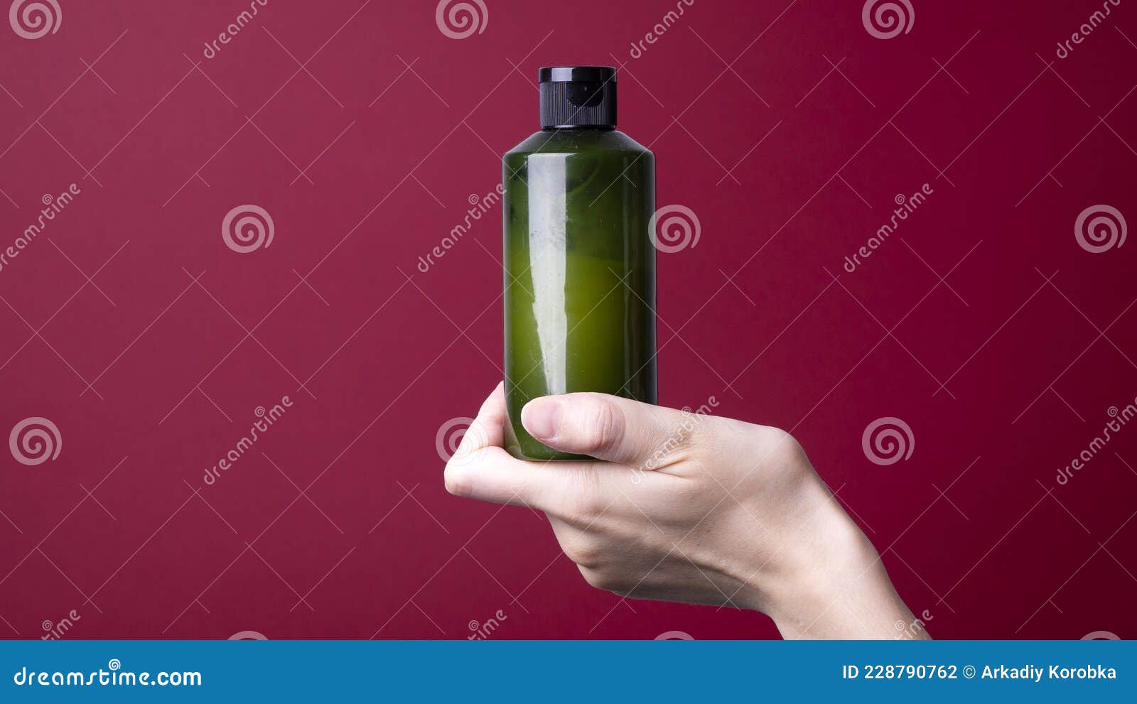 Woman`s Hand Holding a Bottle of Shampoo Stock Photo - Image of ...