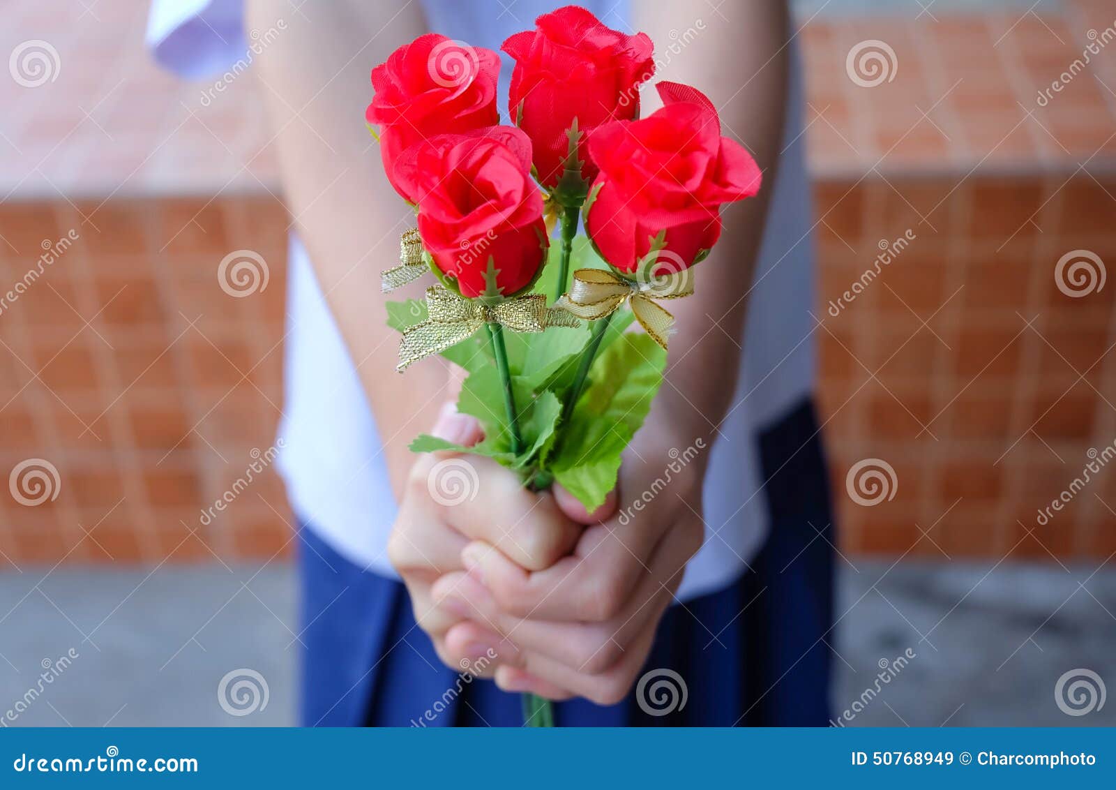 Hand Holding Bouquet of Red Roses Stock Image - Image of florist ...
