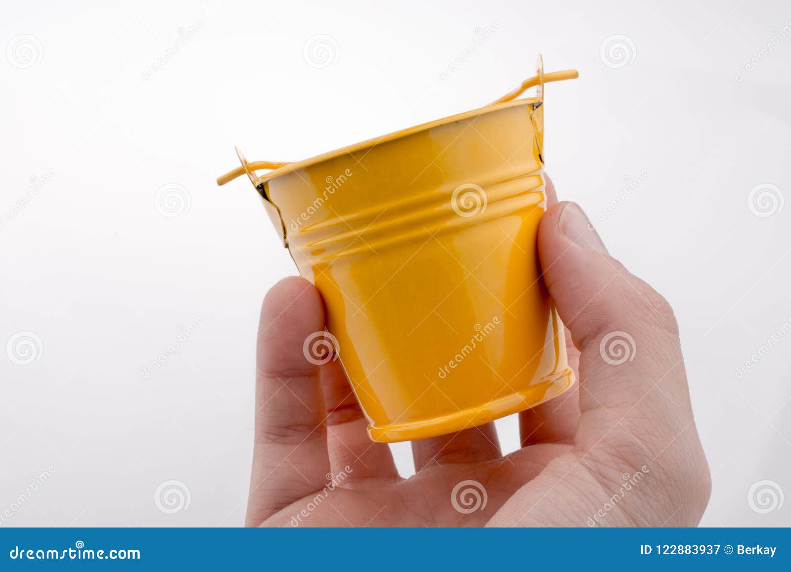Hand holding a bucket stock image. Image of bucket, container - 122883937