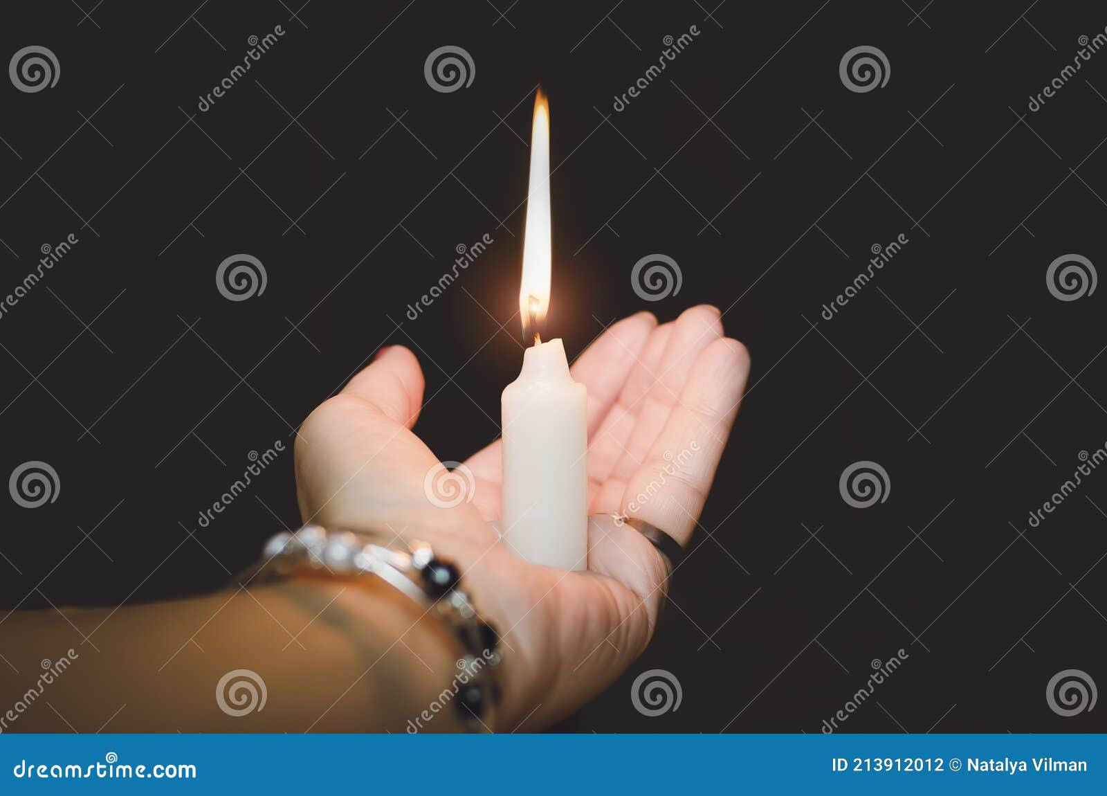 Hand Holding a Burning Candle in Dark Stock Photo - Image of hope ...