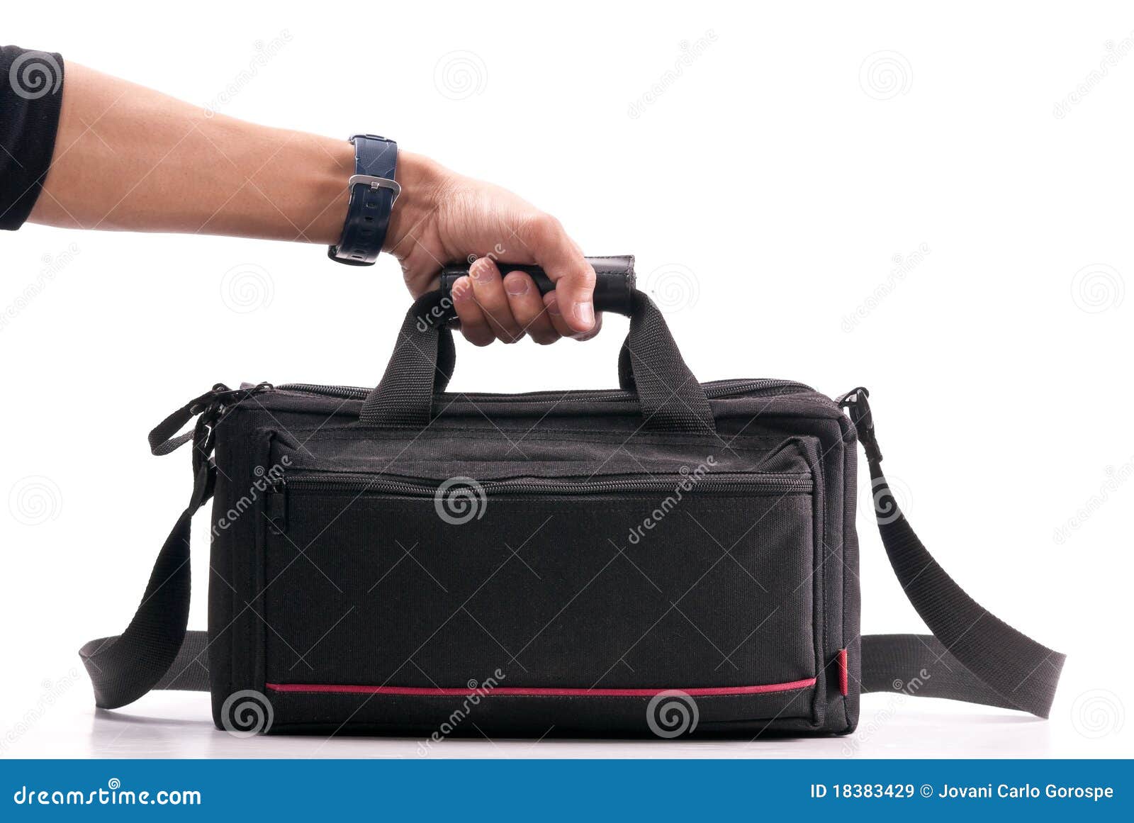Hand Holding a Camera Bag stock image. Image of carrier - 18383429