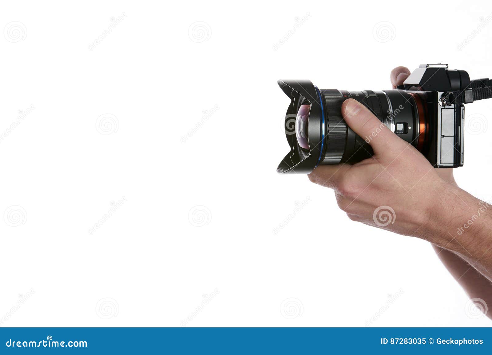 Hand Holding Camera while Isolated on White Stock Image - Image of ...