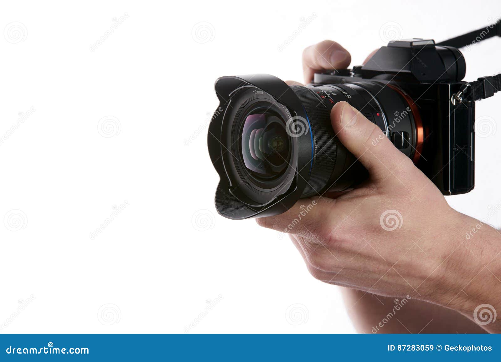 Hand Holding Camera while Isolated on White Stock Image - Image of ...