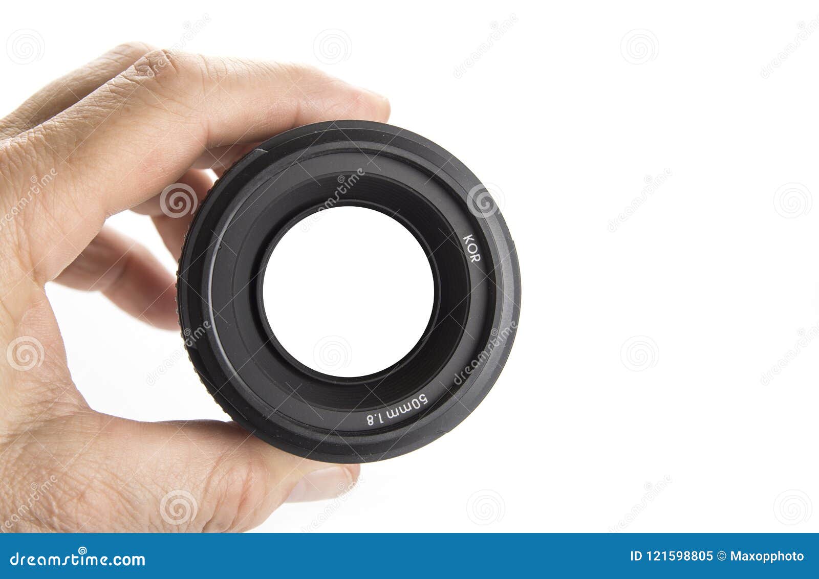 Hand Holding Camera Lens on the White with the Sign Focus on. Stock ...