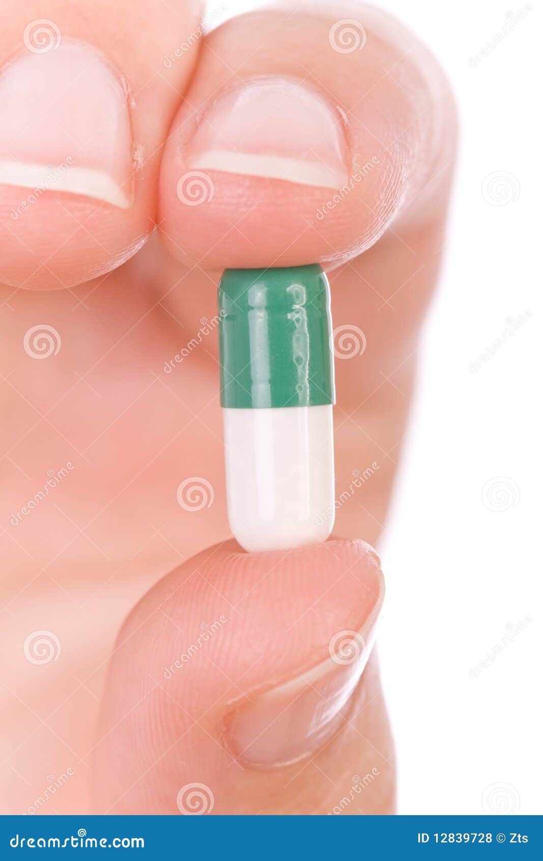 Hand Holding a Capsule or Pill Stock Photo - Image of holding, capsule ...