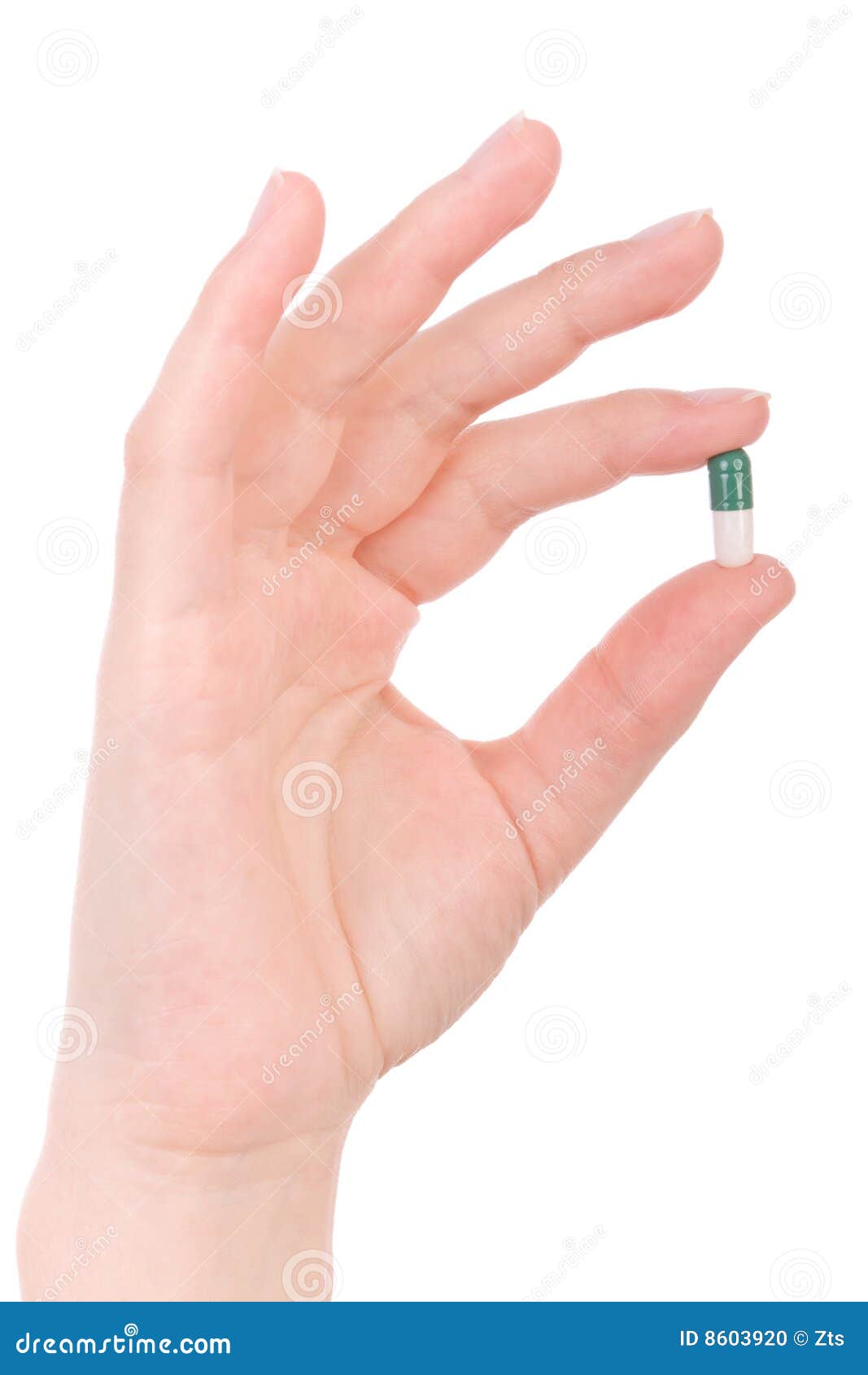 Hand Holding a Capsule or Pill Stock Photo - Image of caucasian, green ...