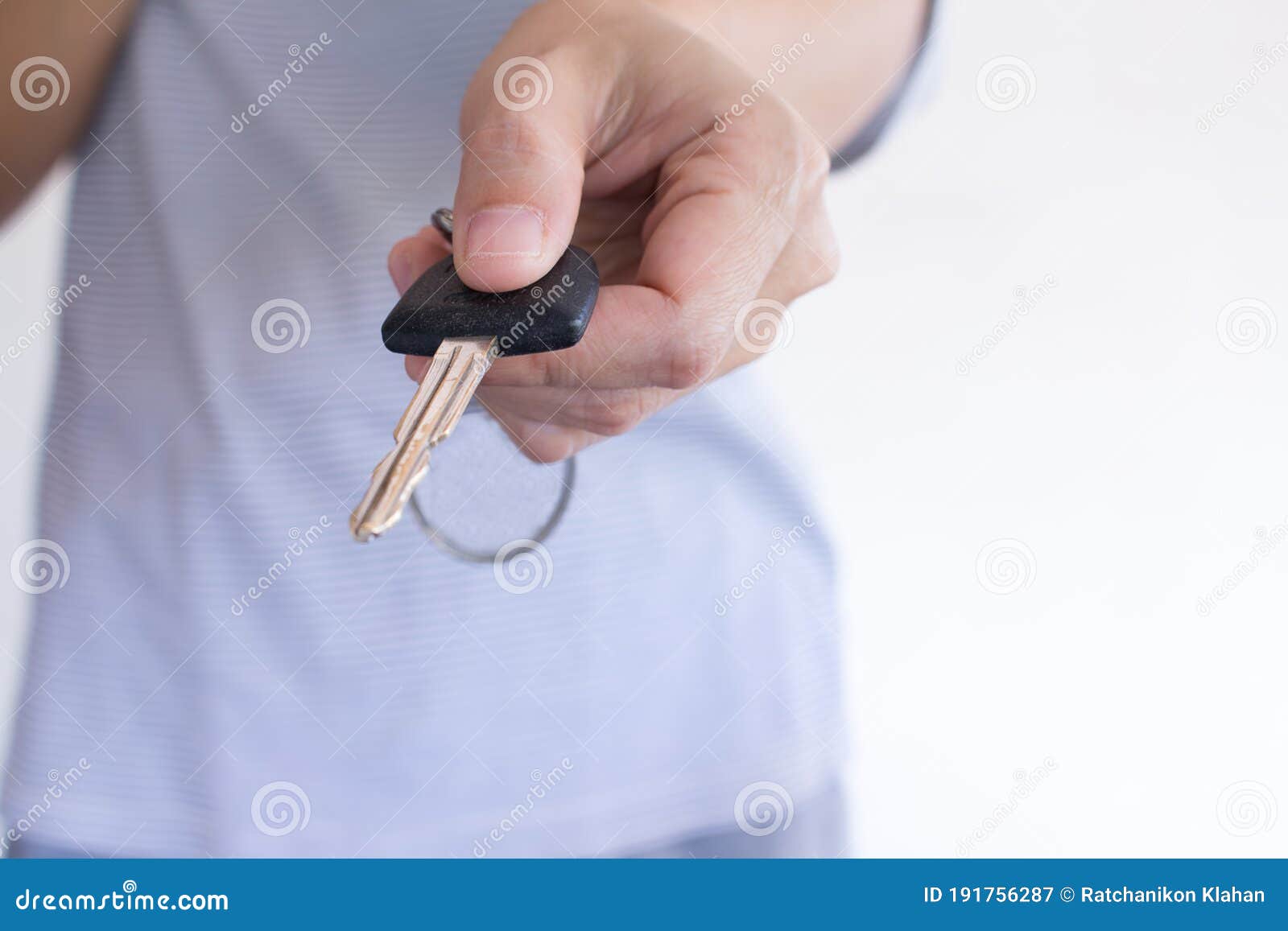 Hand holding a car key stock image. Image of people - 191756287