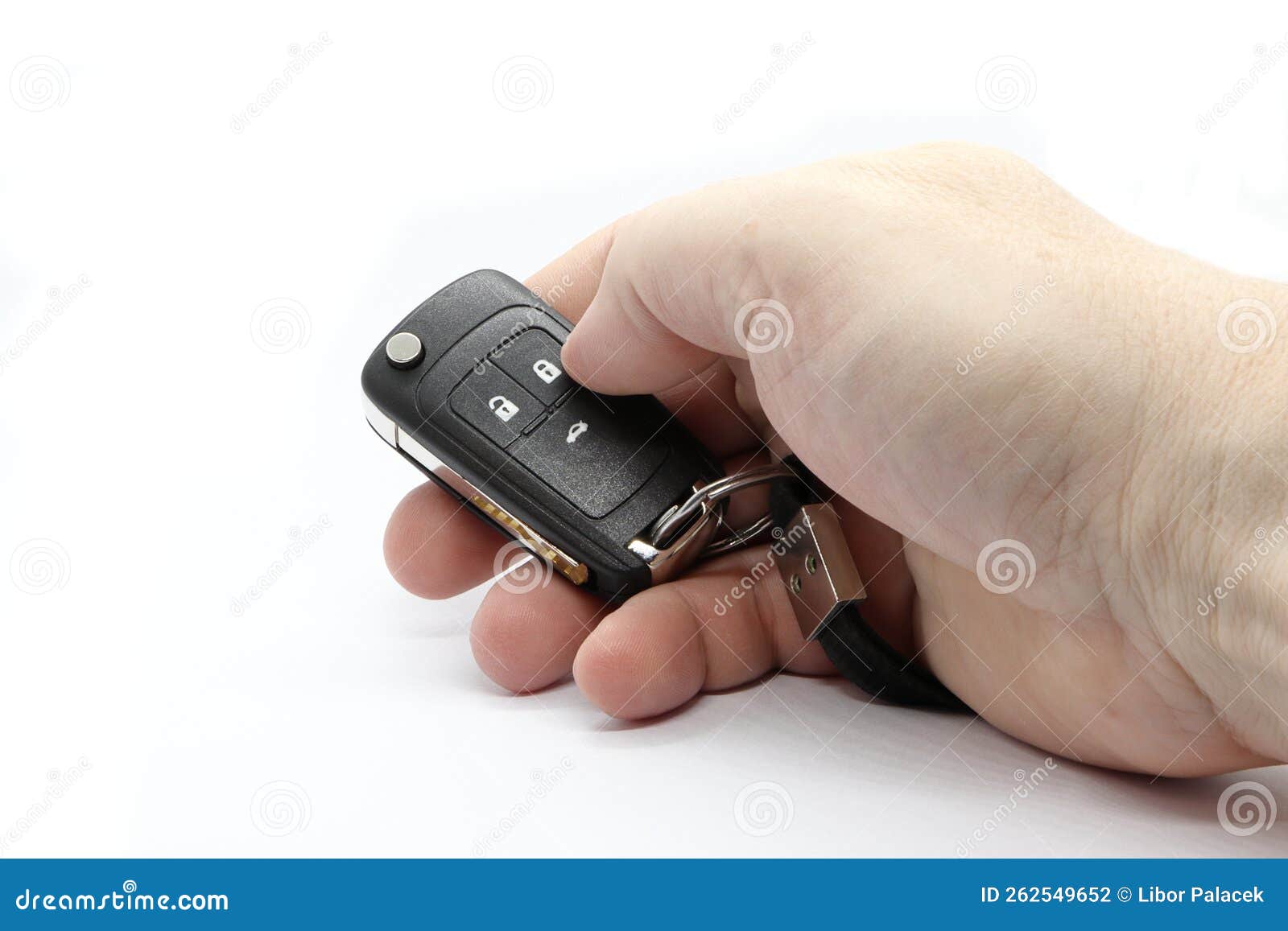 Hand Holding Car Remote Control. White Background Stock Photo - Image ...