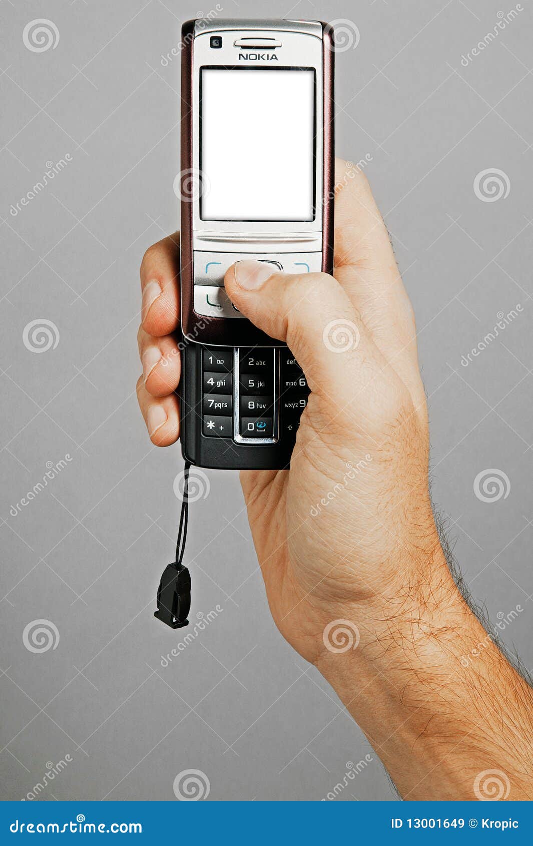 Hand holding cell phone stock image. Image of display - 13001649