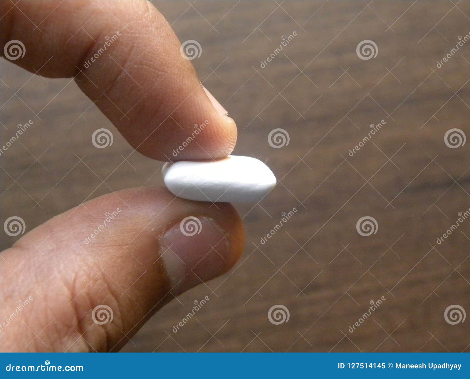 Hand holding Chewing gum stock image. Image of health - 127514145