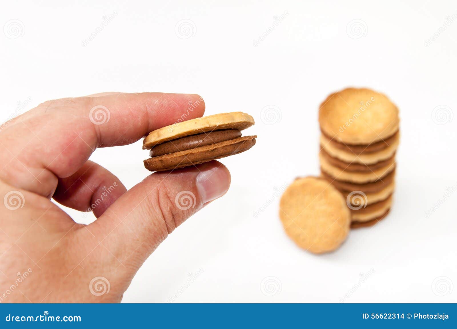 Hand Holding Chocolate Sandwich Biscuits Stock Photo - Image of cake ...