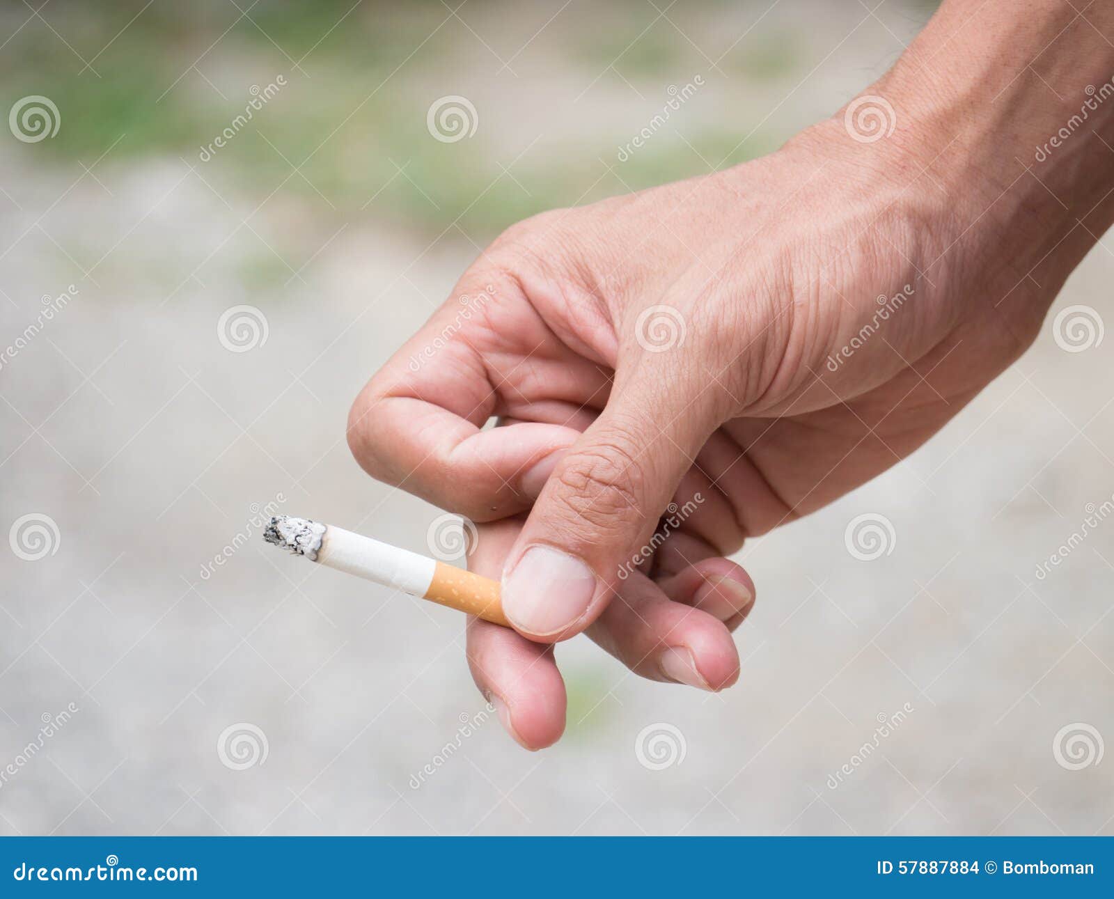Hand Holding Cigarette while Smoking Stock Photo - Image of hand ...