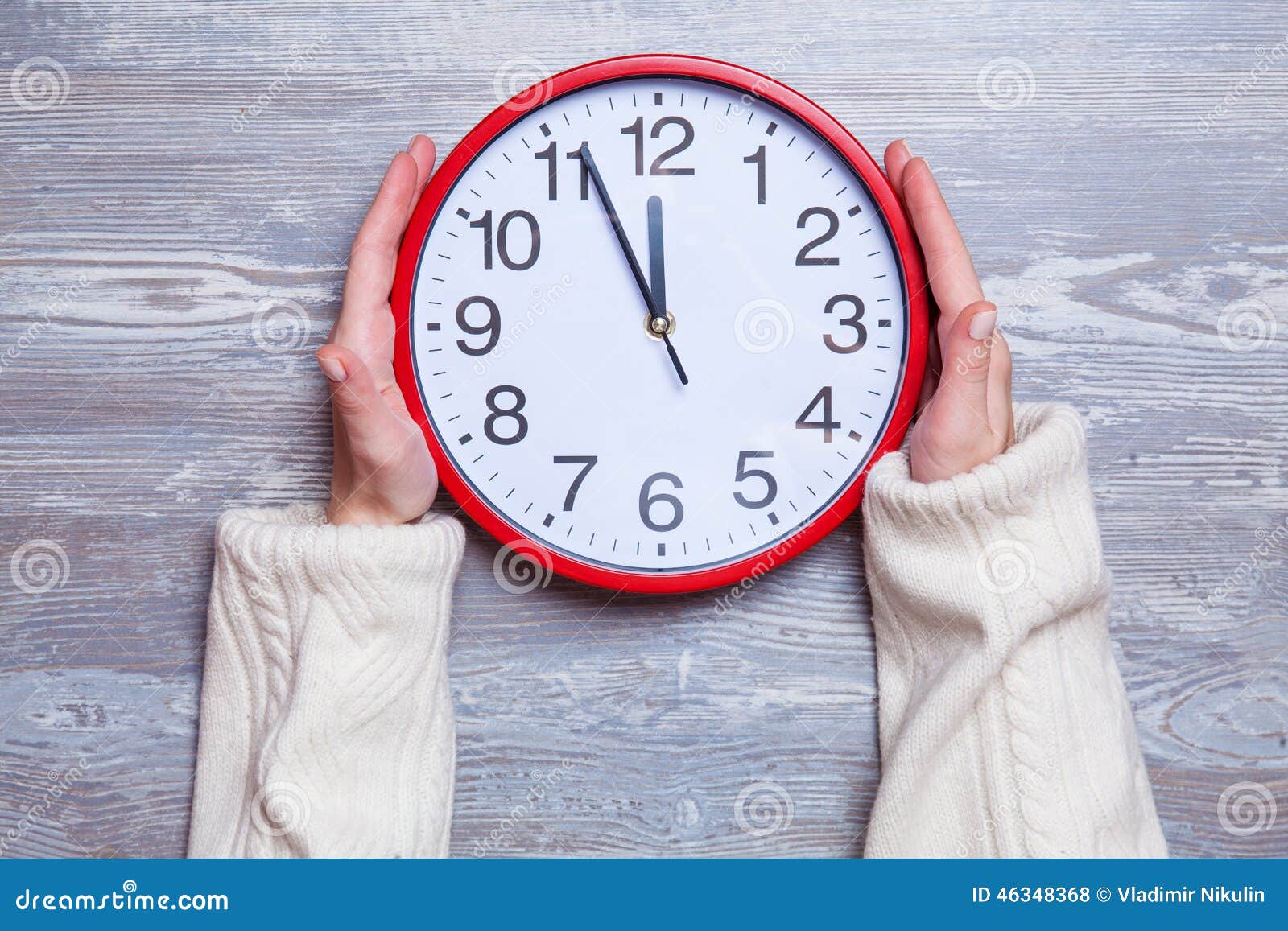 Hand holding clock stock photo. Image of reminder, back - 46348368
