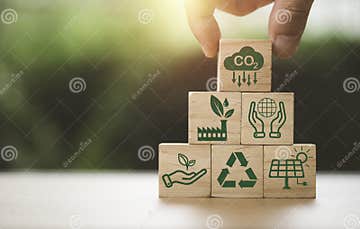 Hand Holding CO2 Reducing ,Recycle ,Green Factory Icon for Decrease CO2 , Carbon Footprint and ...