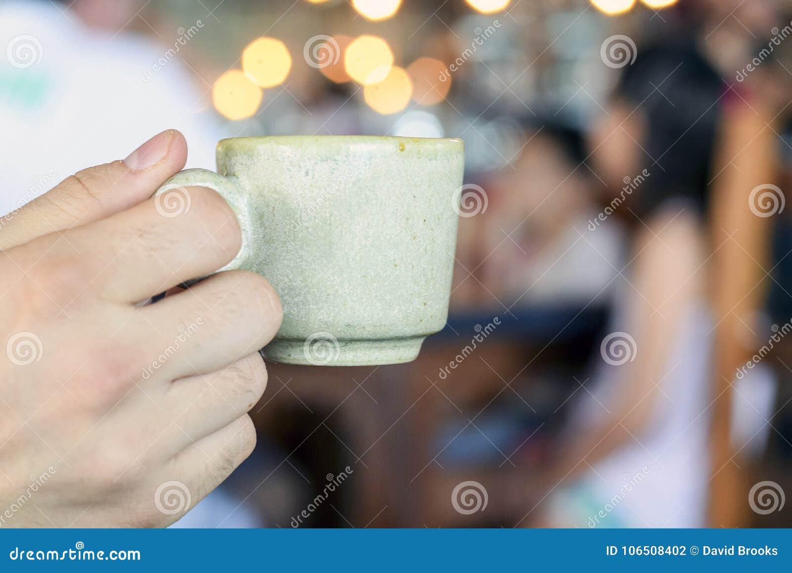 Hand holding coffee mug stock photo. Image of caucasian - 106508402