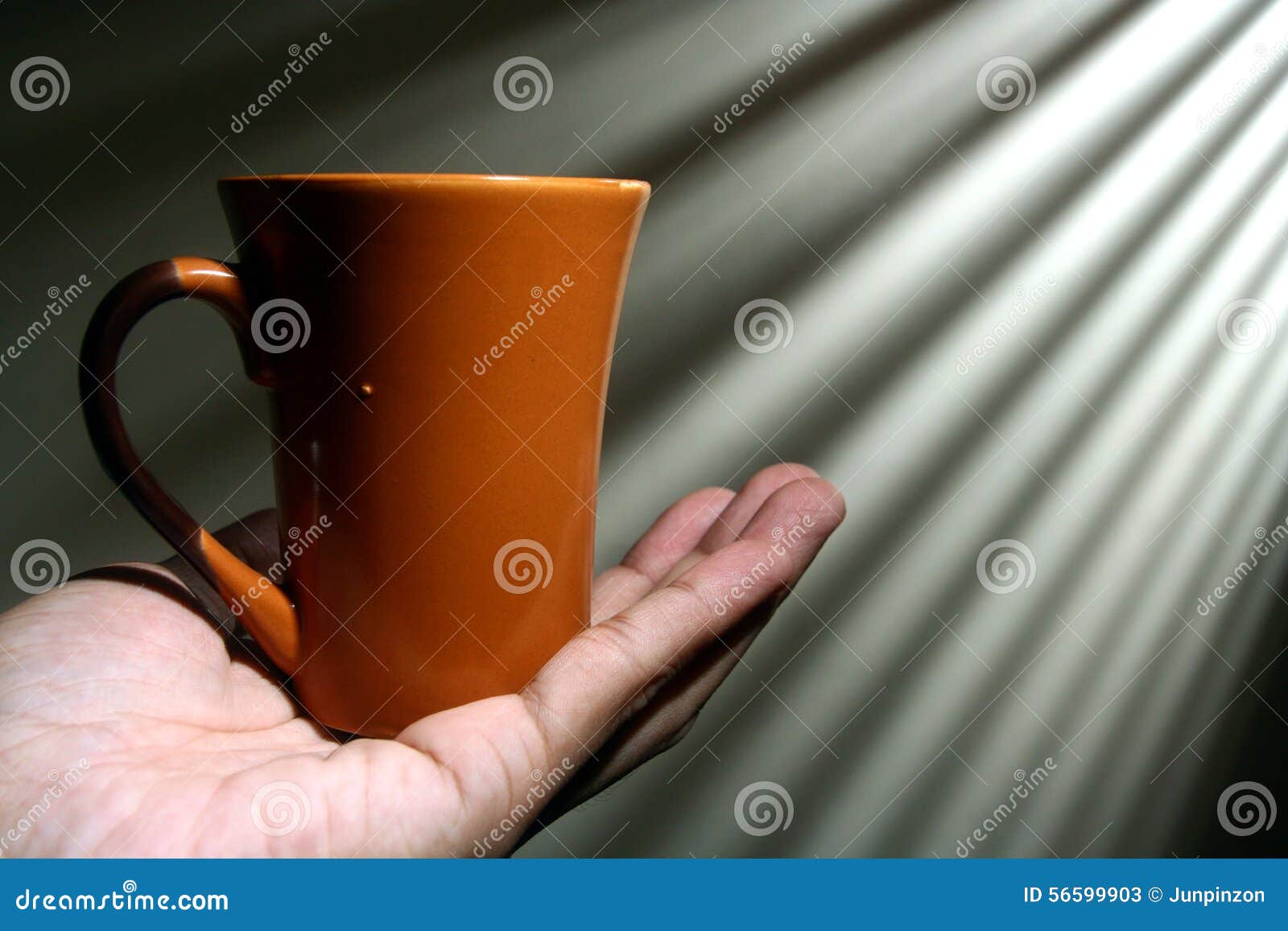 Hand holding a coffee mug stock image. Image of coffee - 56599903