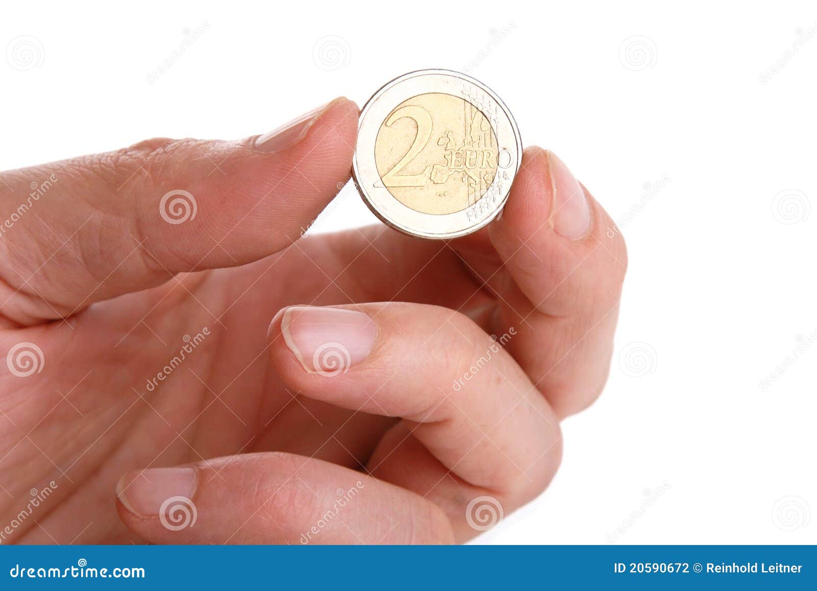 Hand holding a coin. stock photo. Image of hand, gold - 20590672