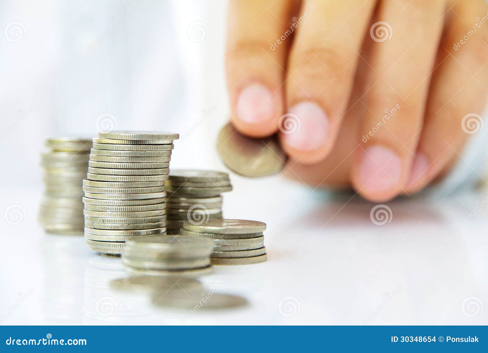 Hand holding coin stack stock photo. Image of finance - 30348654