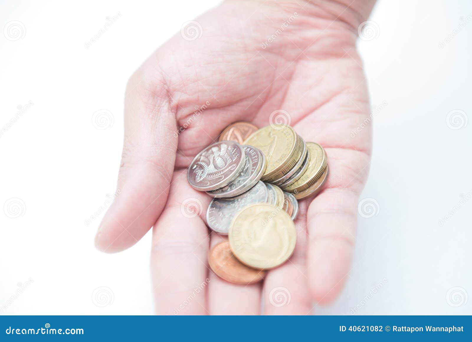 Hand holding coins stock photo. Image of holding, bare - 40621082