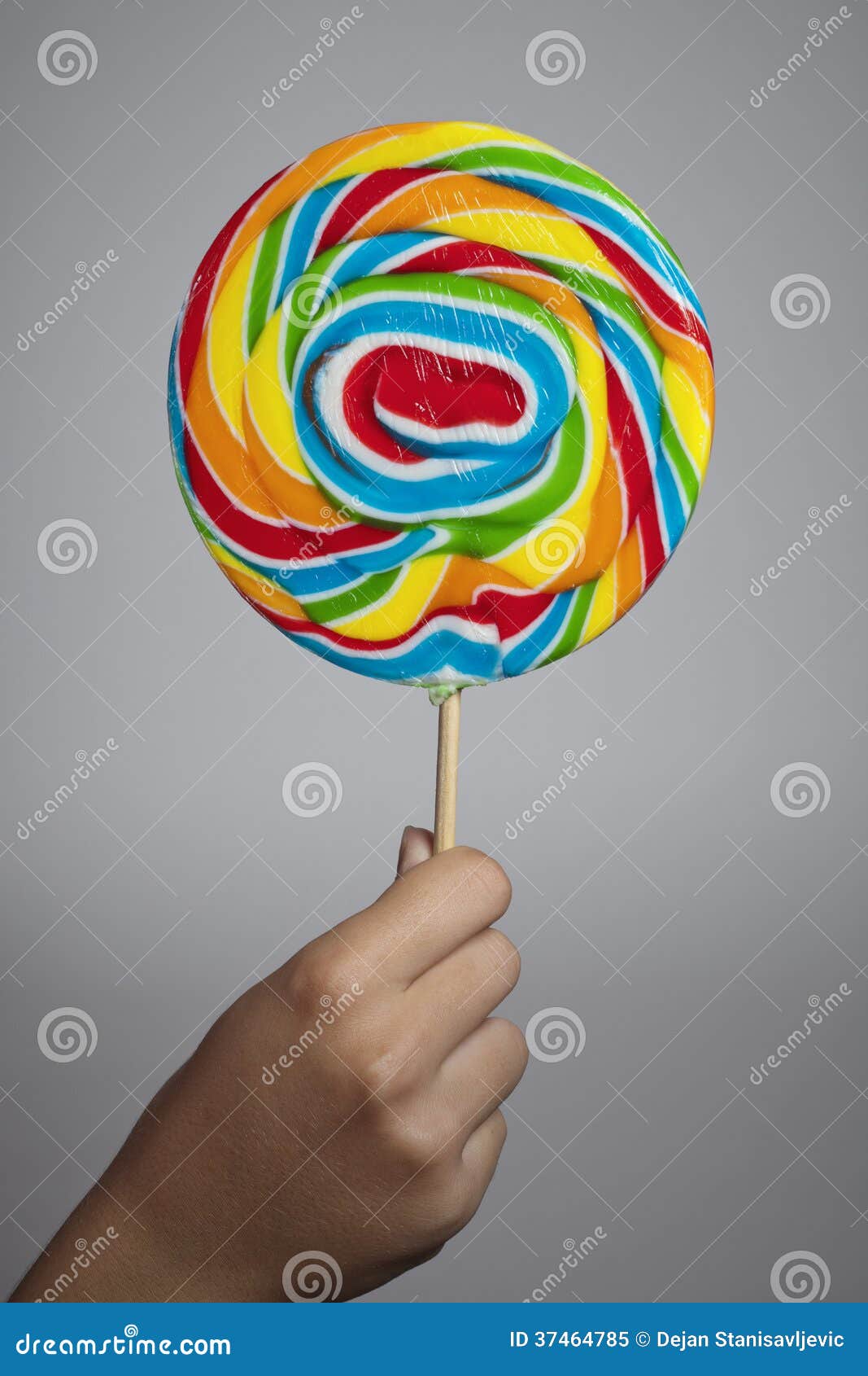 Hand Holding Colorful Lollipop Candy Stock Image - Image of birthday ...