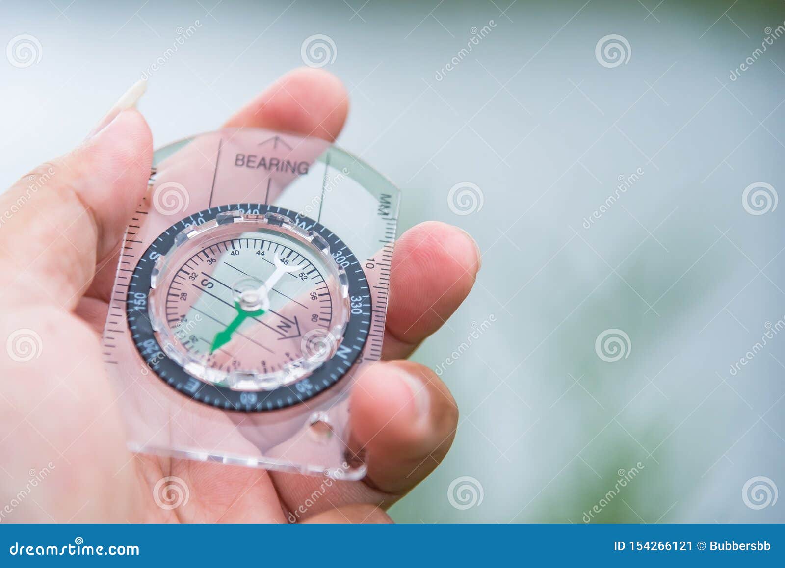 Hand holding the compass stock image. Image of discovery - 154266121