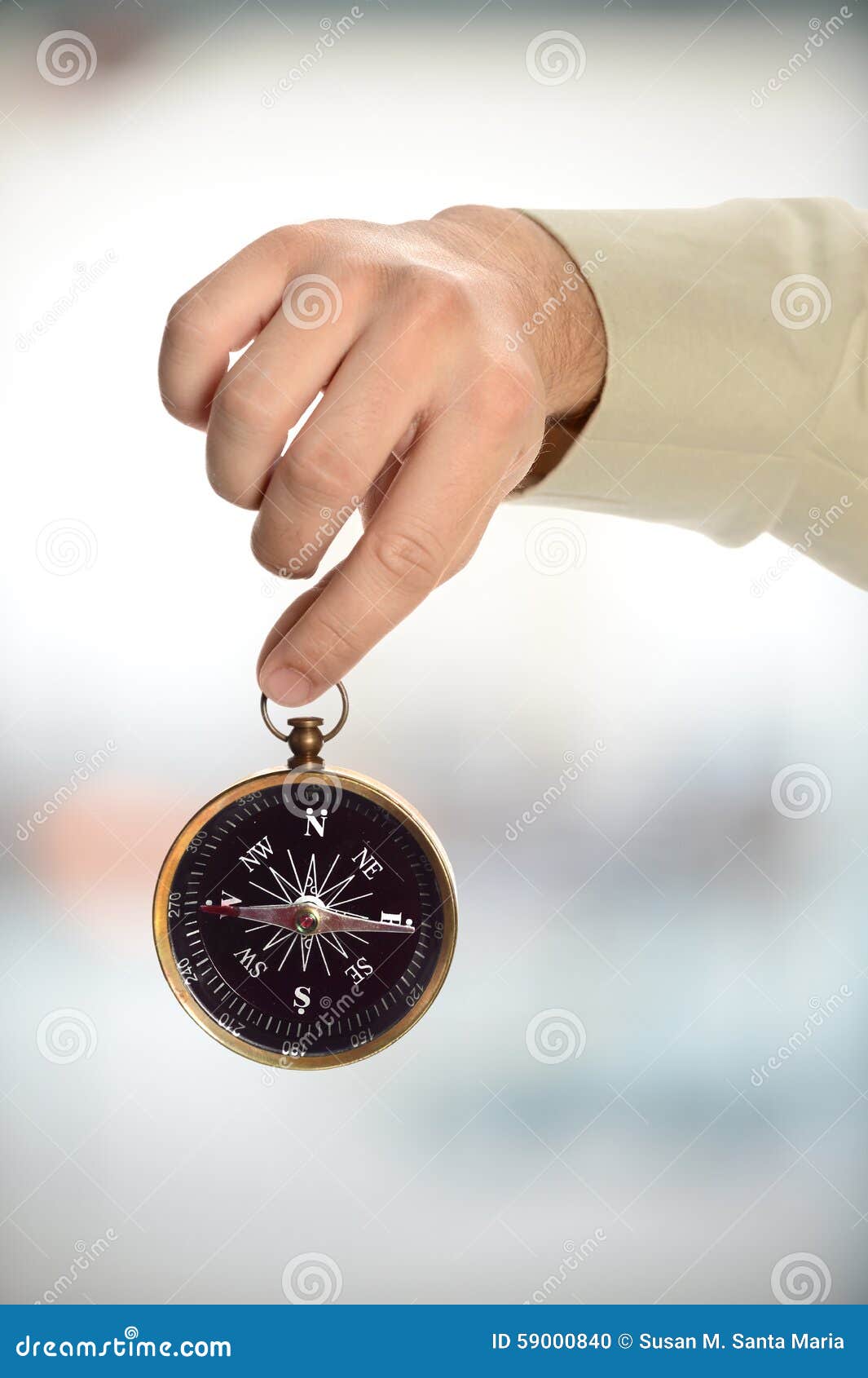 Hand Holding Compass stock photo. Image of concept, businessman - 59000840