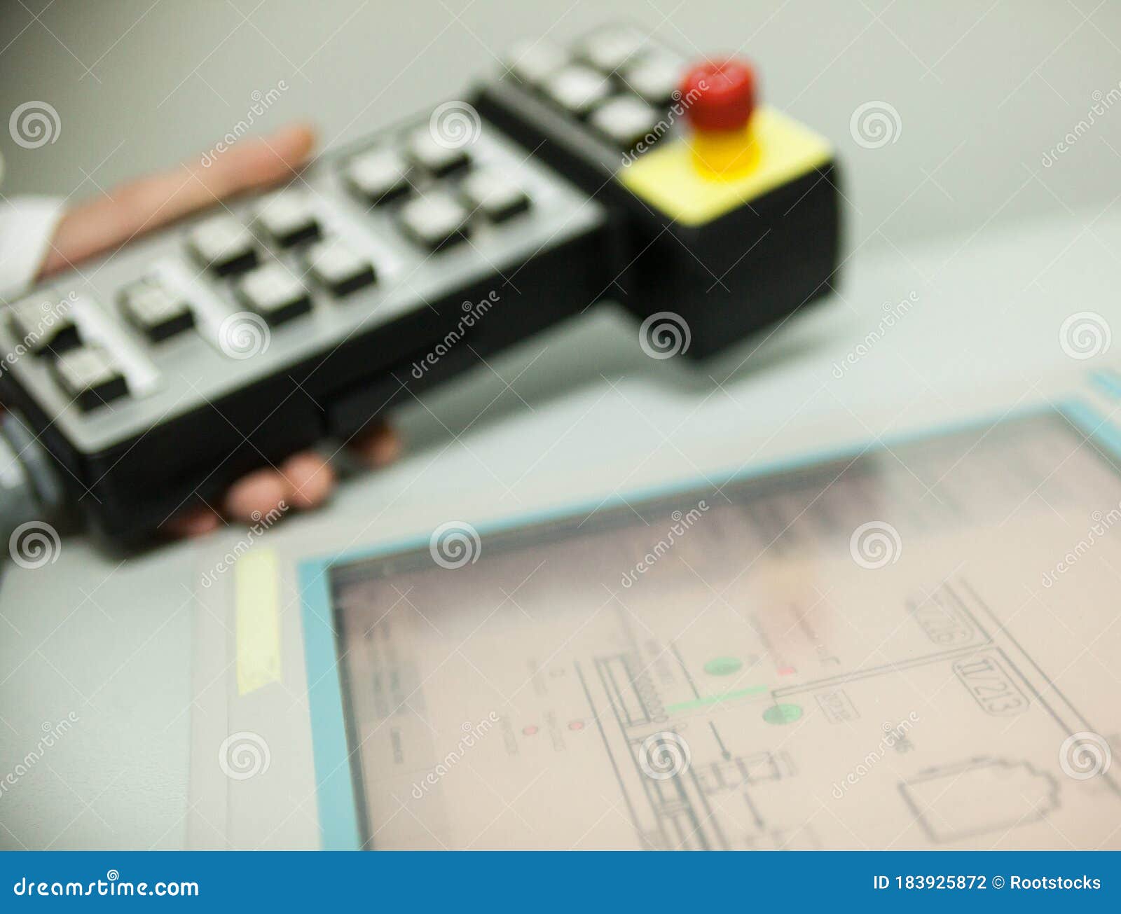 Hand Holding the Control Panel Stock Photo - Image of button, desk ...