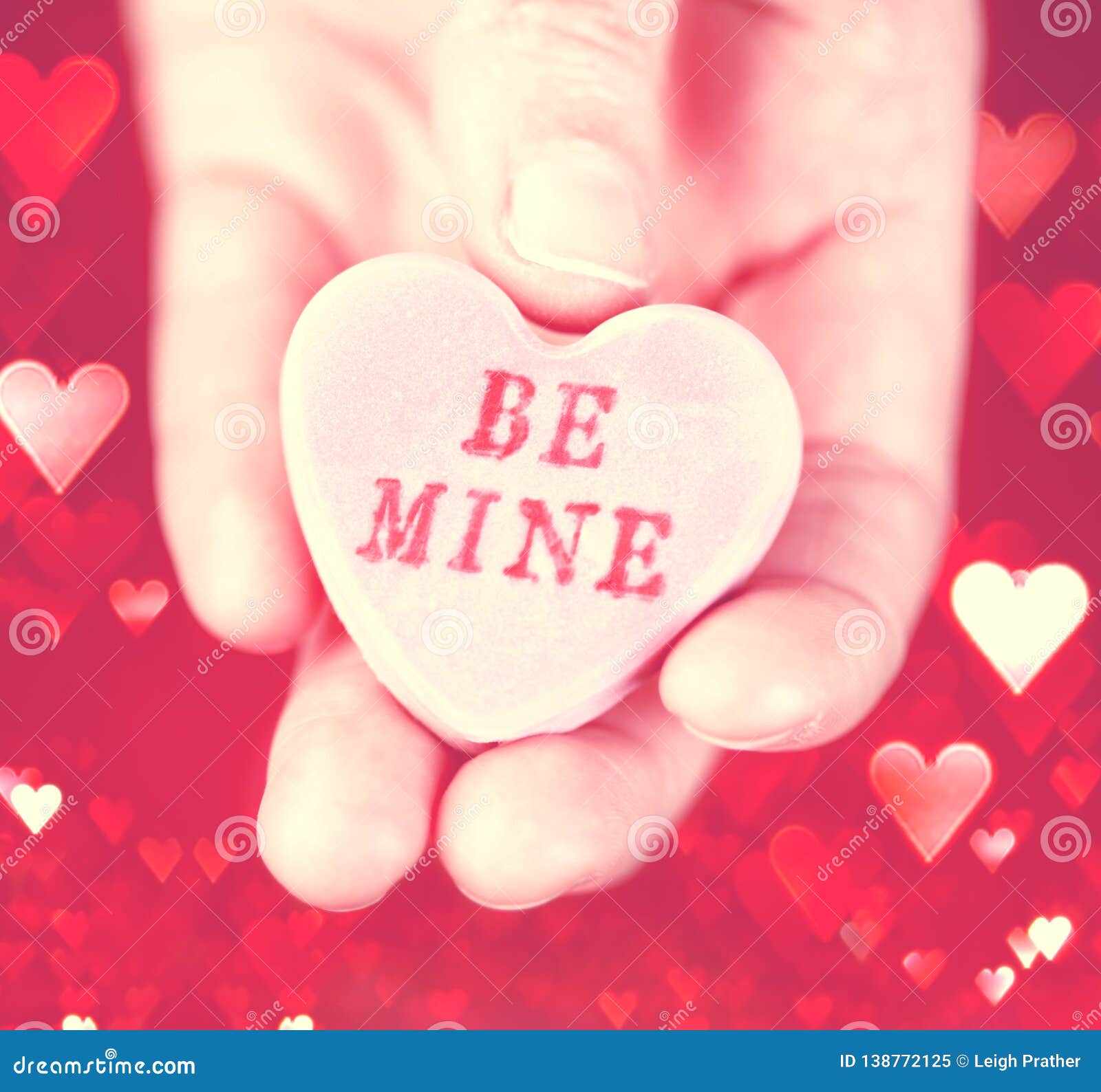 Hand Holding Conversation Heart - Be Mine Stock Image - Image of pink ...