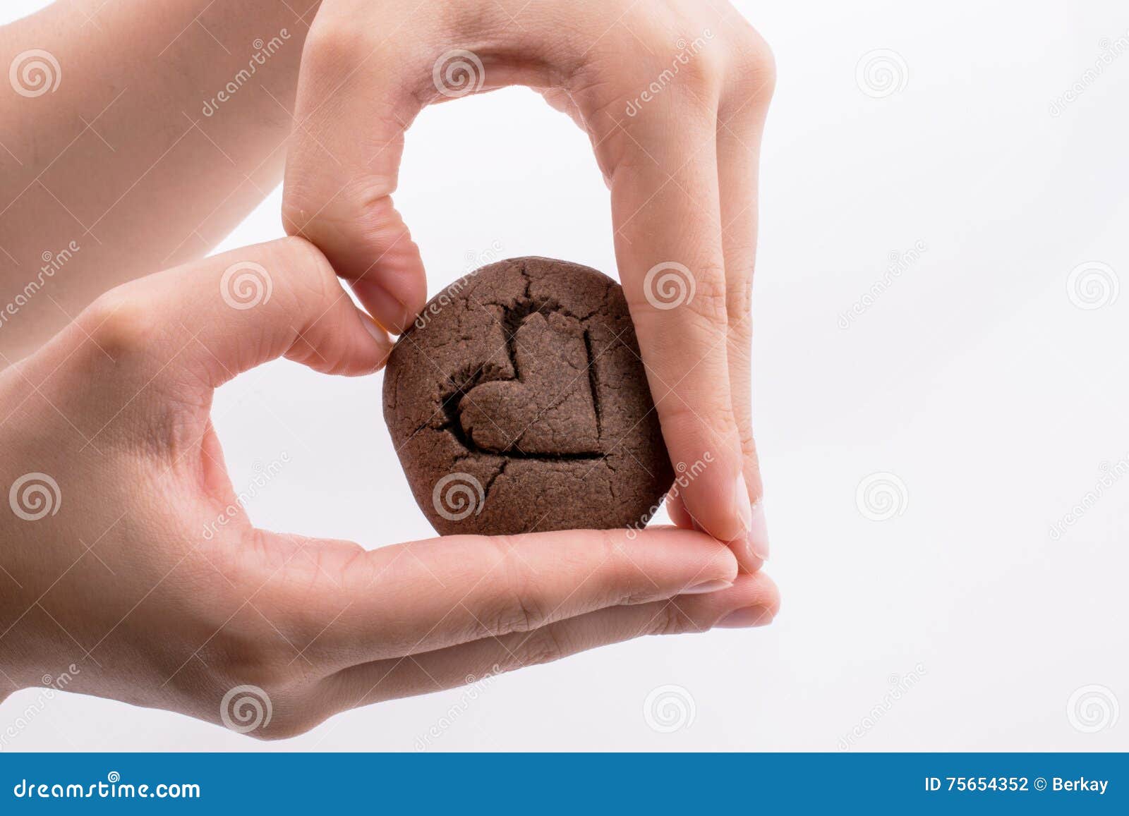 Hand holding a cookie stock photo. Image of abstract - 75654352