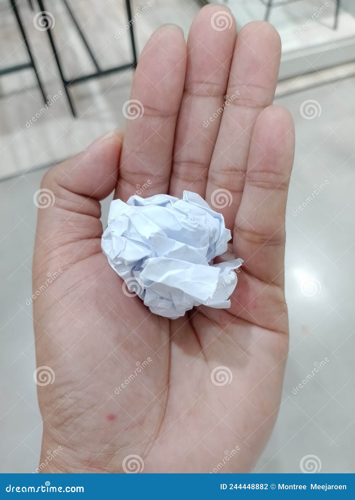 The Hand Holds a Lump of White Paper Stock Photo - Image of page ...