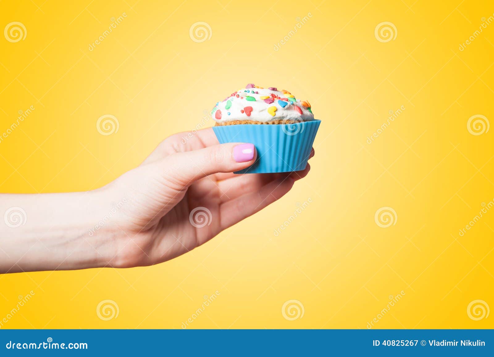 Hand holding cupcake stock image. Image of bread, delicious - 40825267