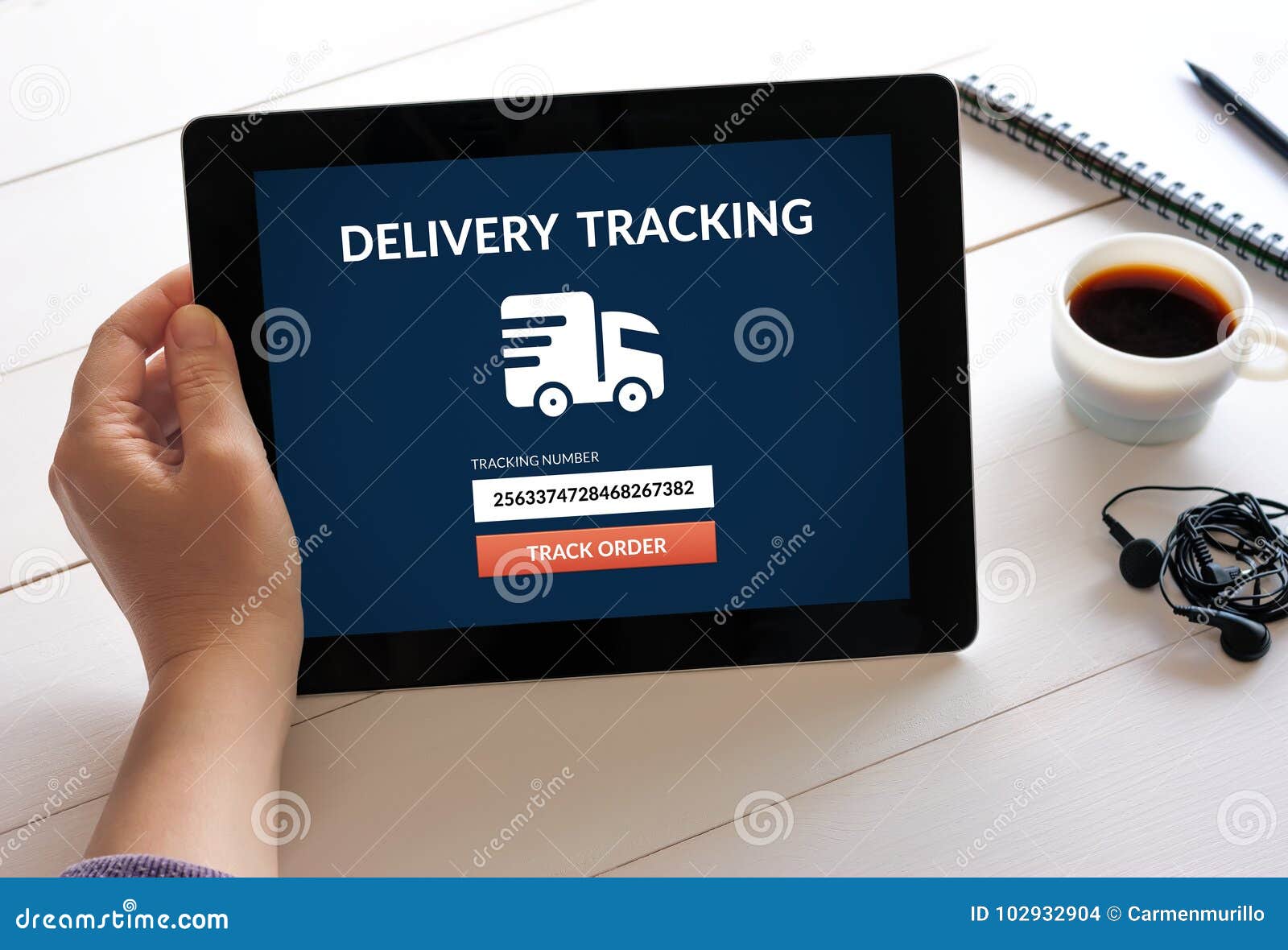 Hand Holding Tablet with Delivery Tracking Concept on Screen Stock ...
