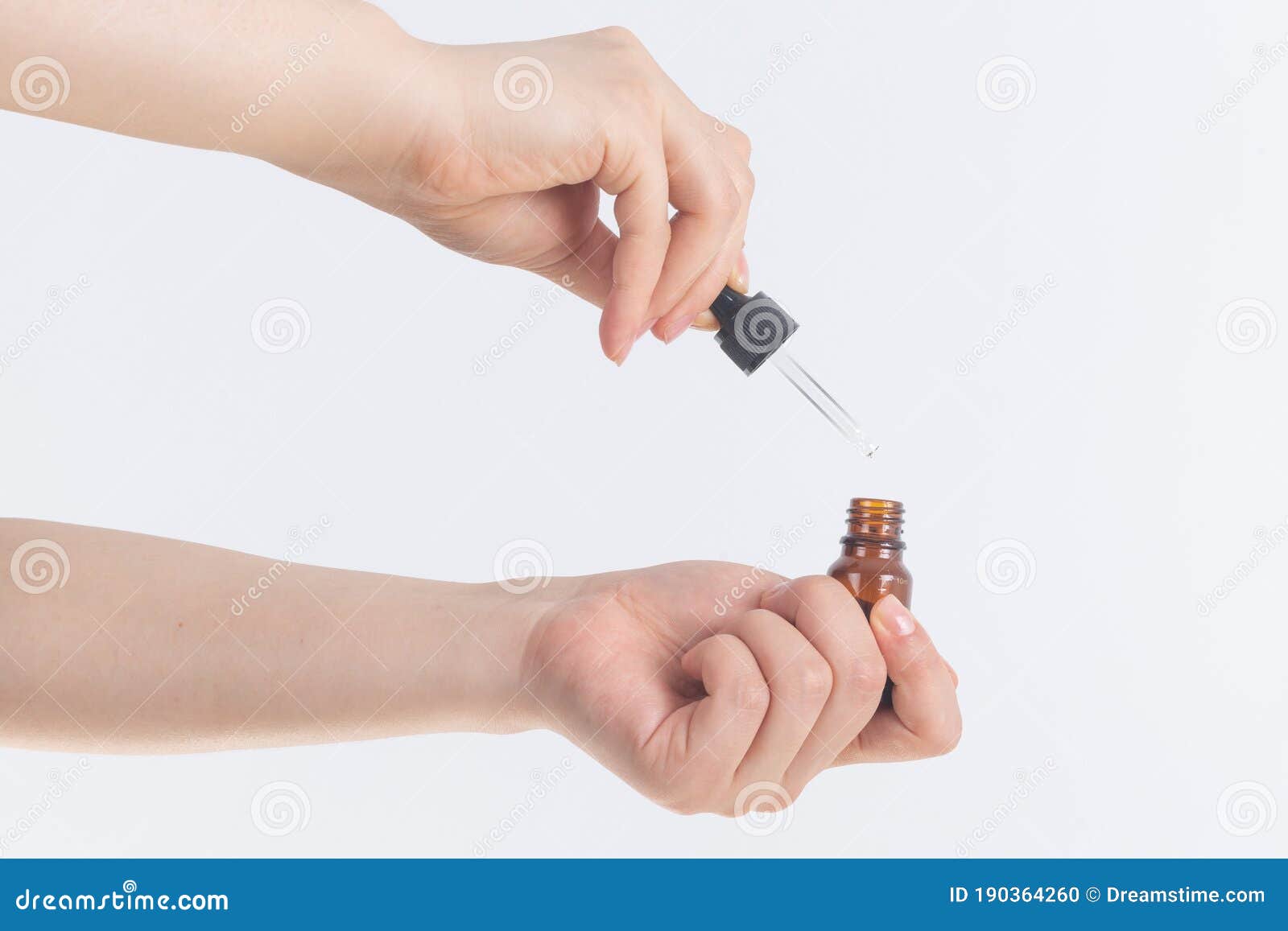 Hand Holding Dropper on White Background Stock Photo - Image of ...
