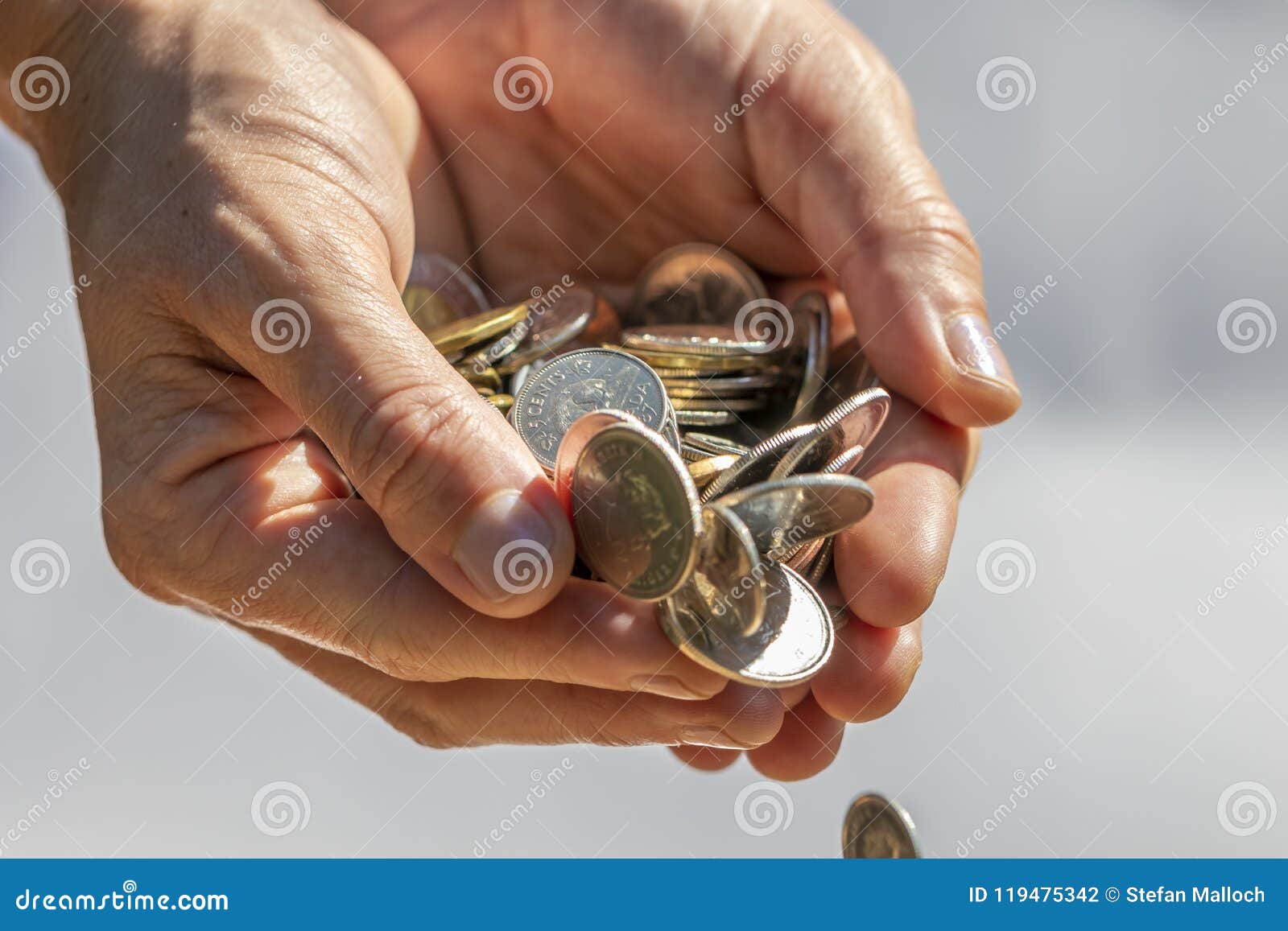 A Hand Holding and Dropping Coins Editorial Photography - Image of ...