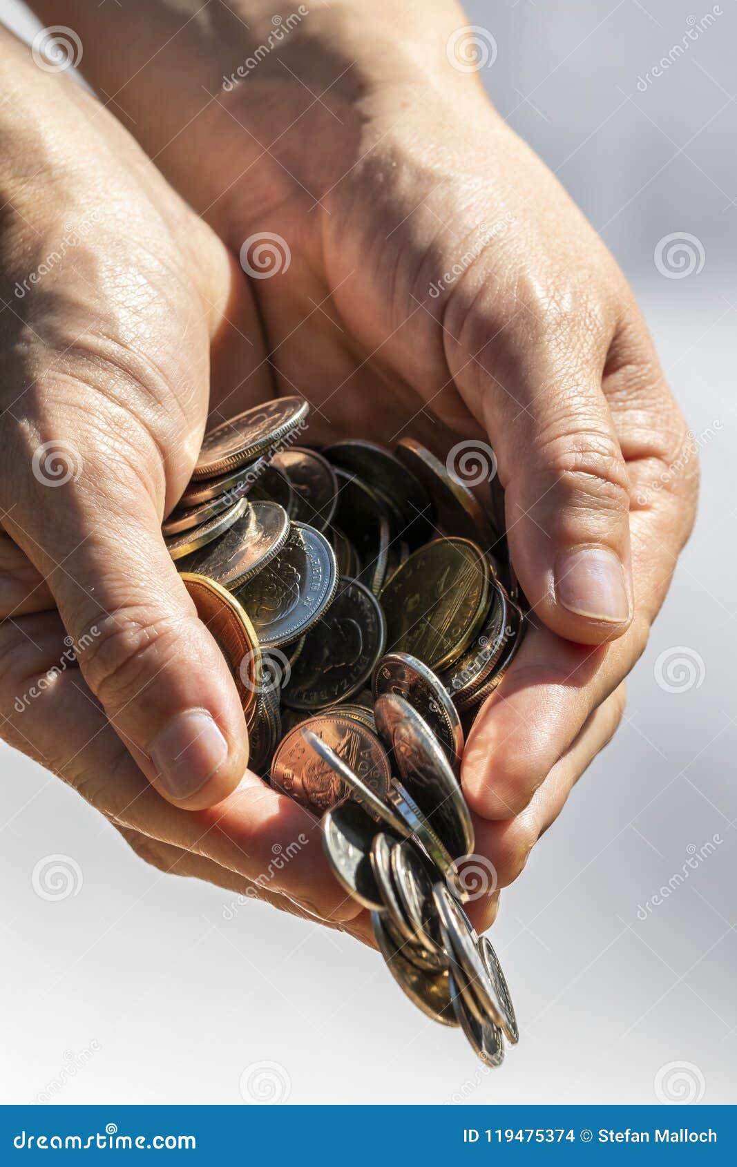 A Hand Holding and Dropping Coins Editorial Stock Image - Image of ...