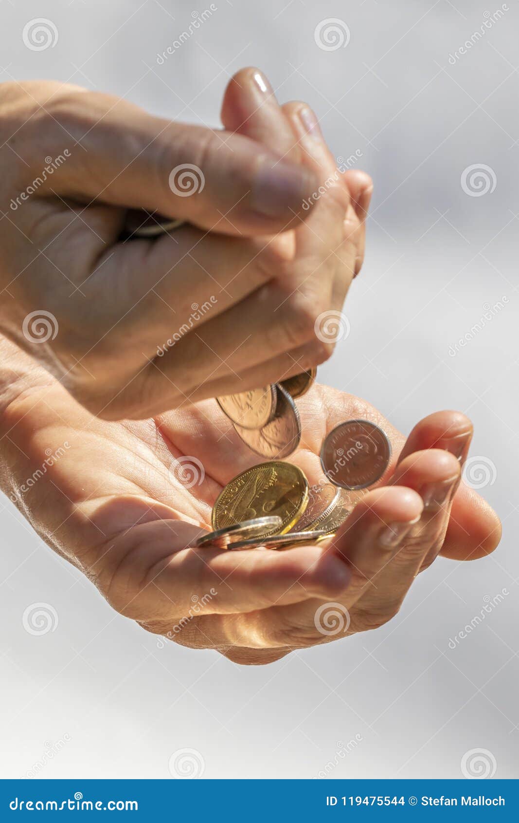 A Hand Holding and Dropping Coins Editorial Stock Image - Image of ...