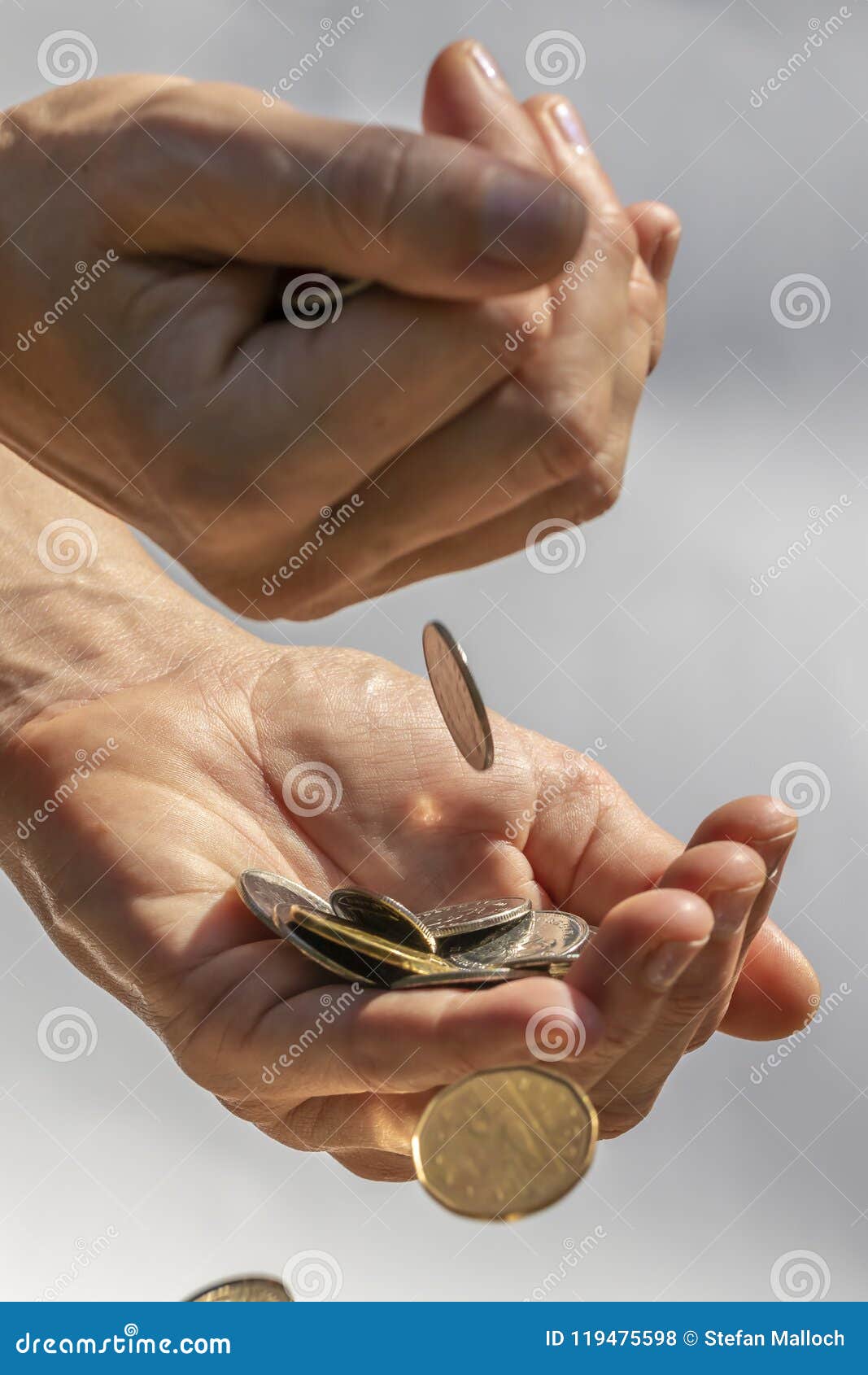 A Hand Holding and Dropping Coins Editorial Stock Photo - Image of ...