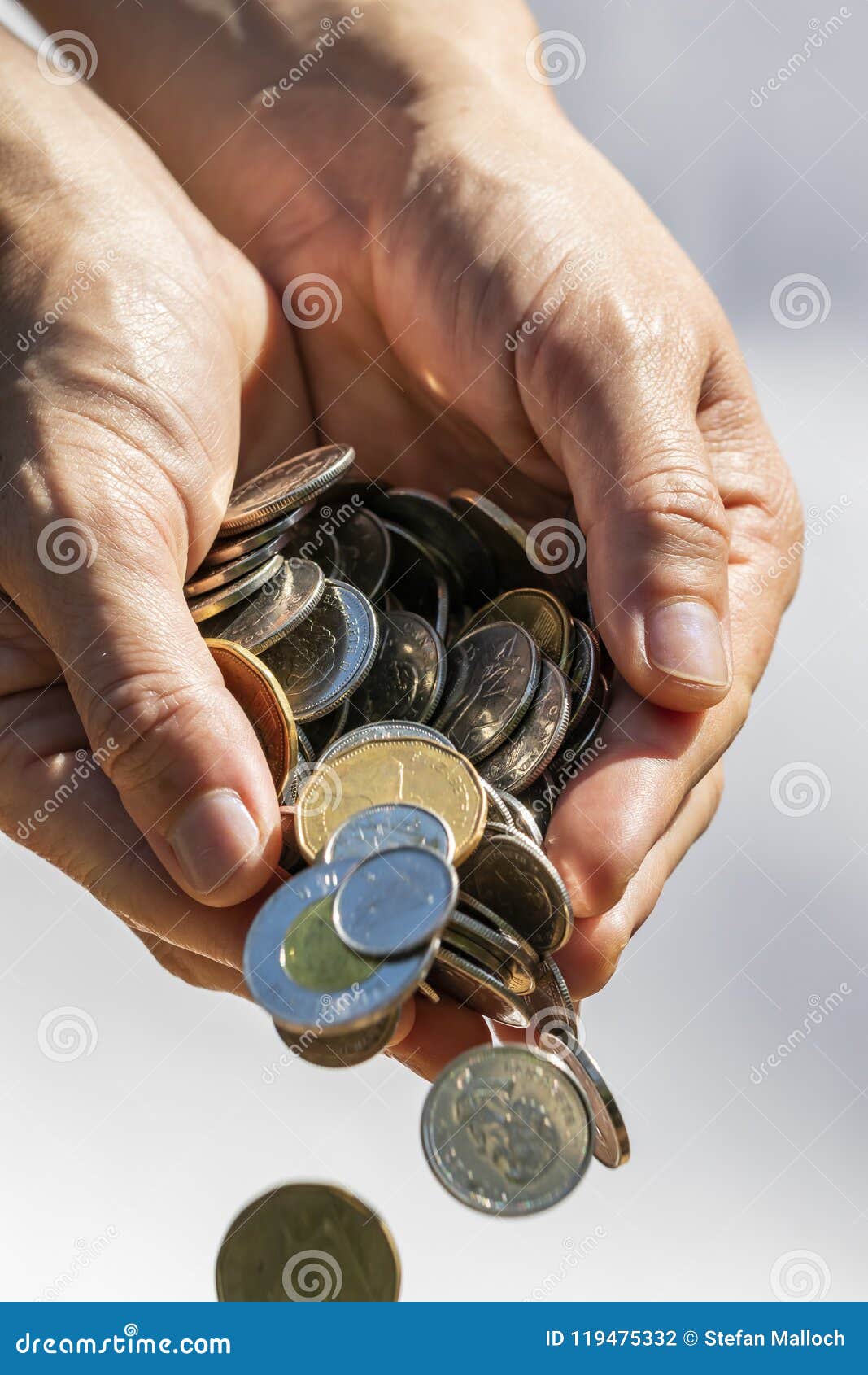 A Hand Holding and Dropping Coins Editorial Photography - Image of palm ...
